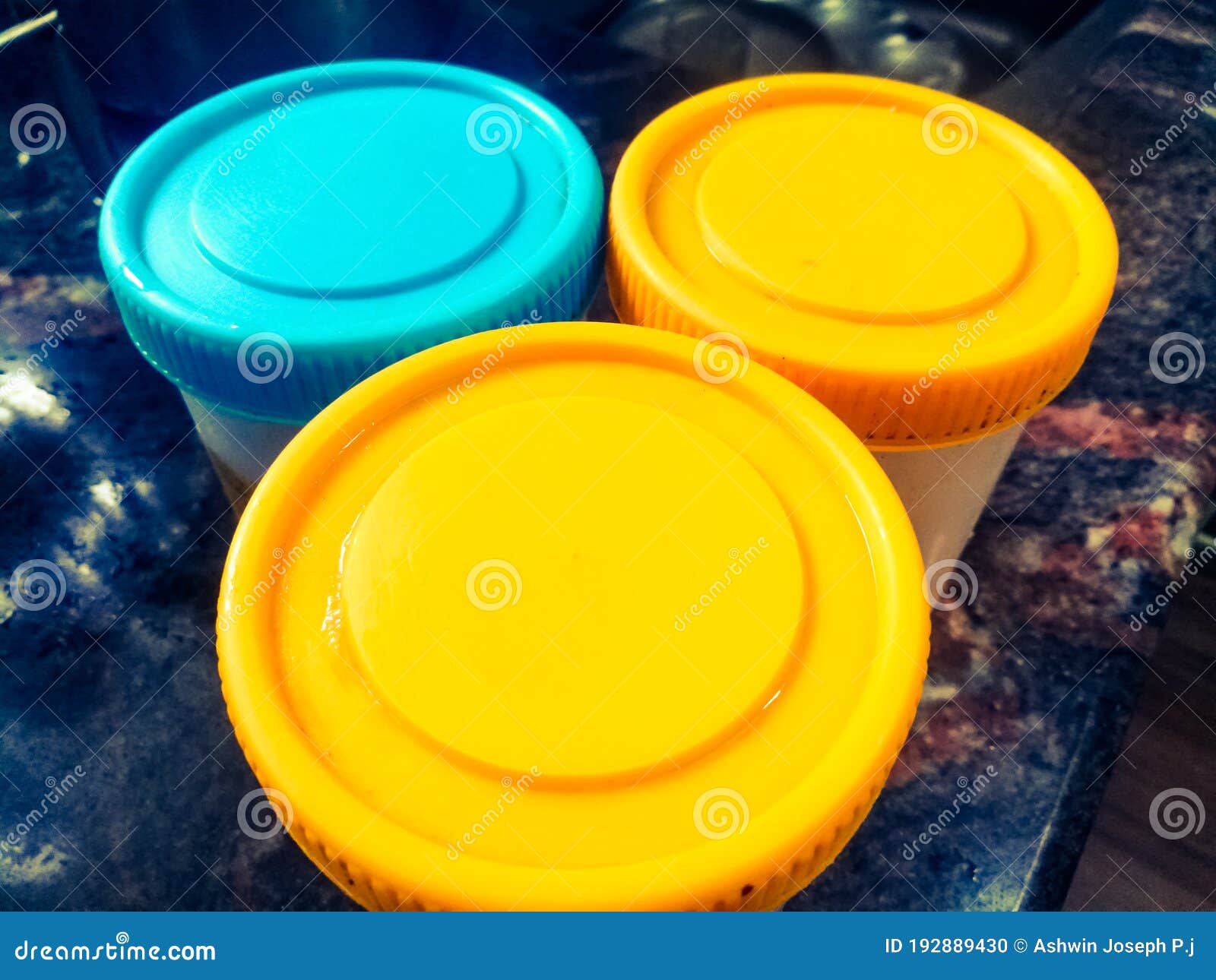 Three Containers Placed in a Table Making a Triangle Shape. Stock Photo ...