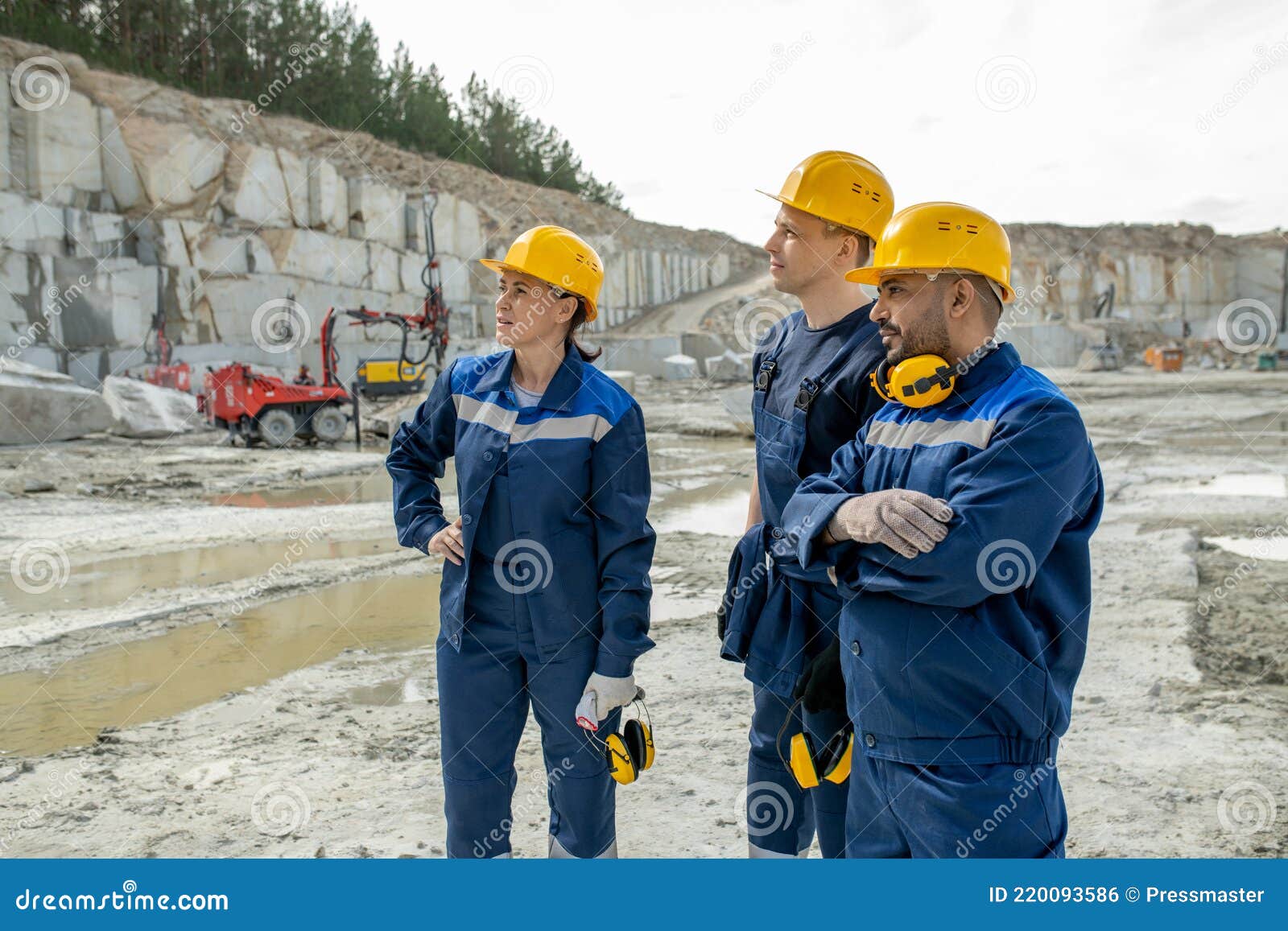Three Contemporary Builders in Uniform Stock Photo - Image of ...