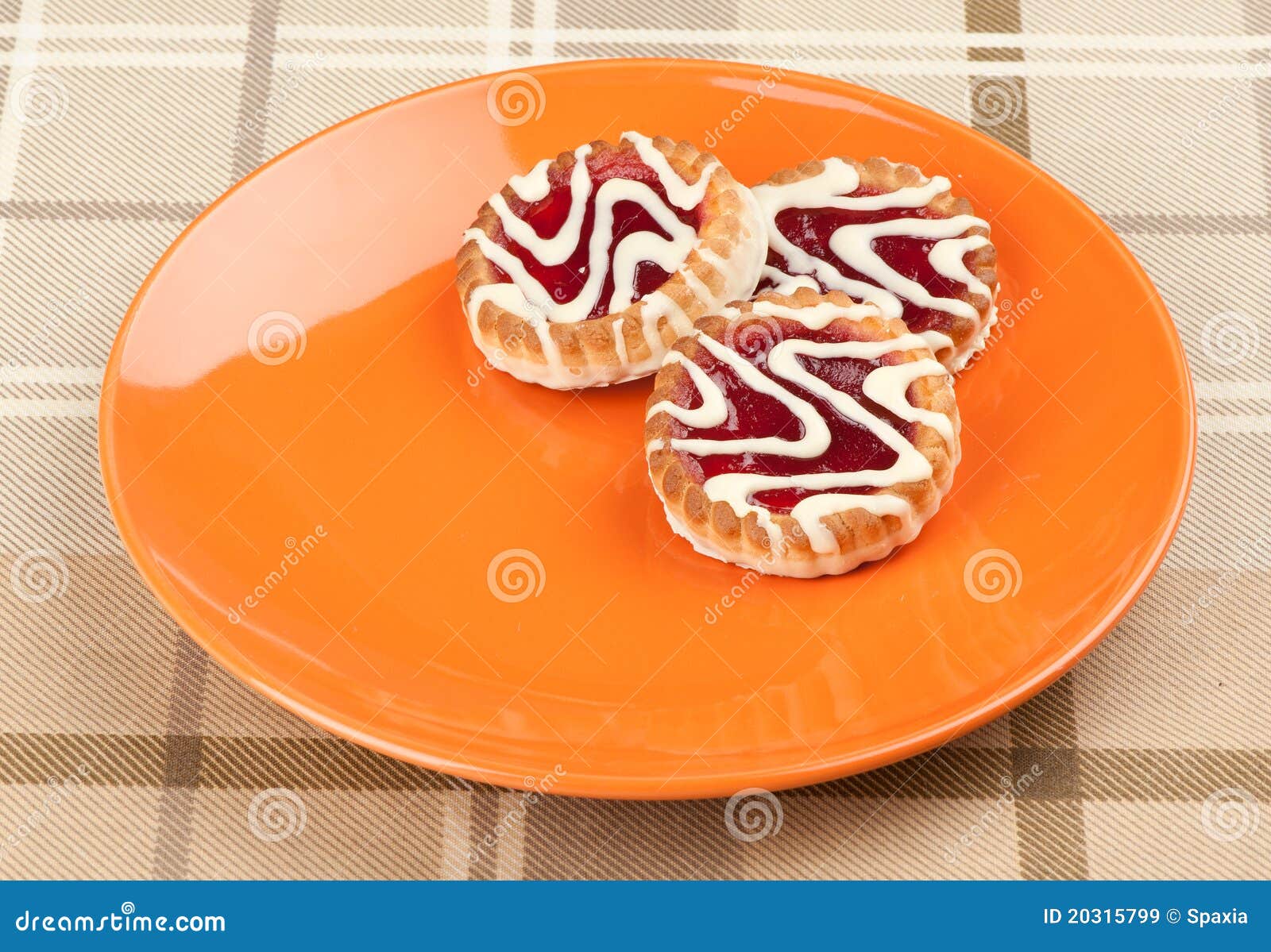 Three cookies on a plate stock image. Image of taste - 20315799