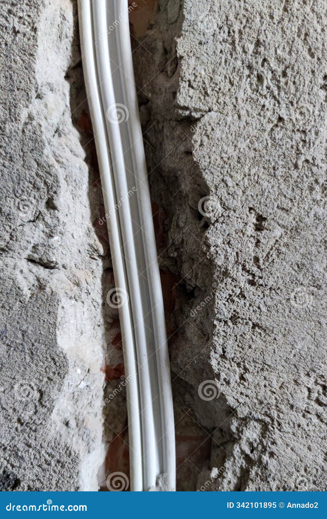 Three-core Electrical Cable in a Groove in a Concrete Wall Stock ...
