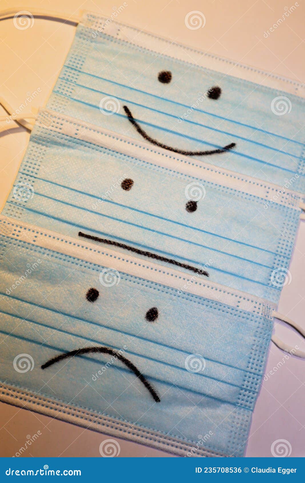 Three Corona Medical Face Masks with Smiling Faces Stock Photo - Image ...