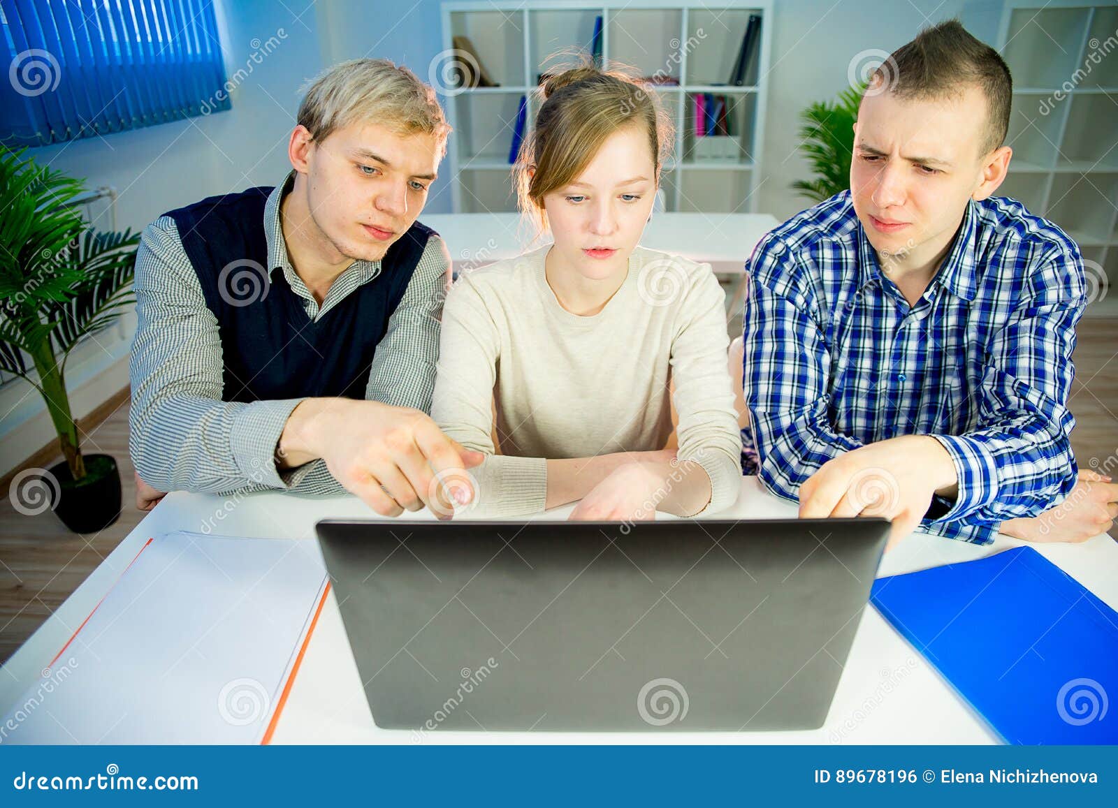 Three coworkers in office stock photo. Image of profession - 89678196