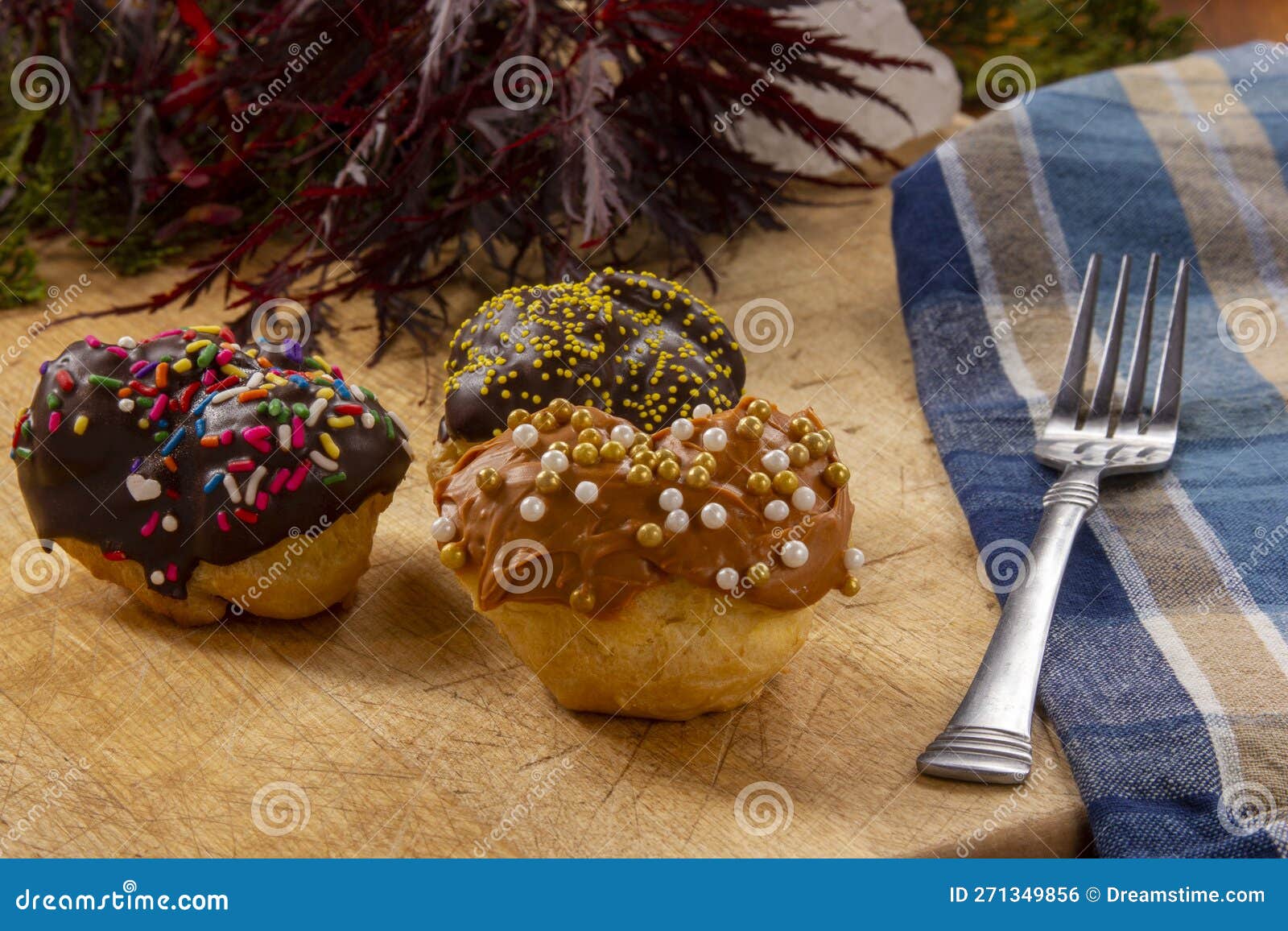 Three cream puffs stock photo. Image of colourful, healthy - 271349856