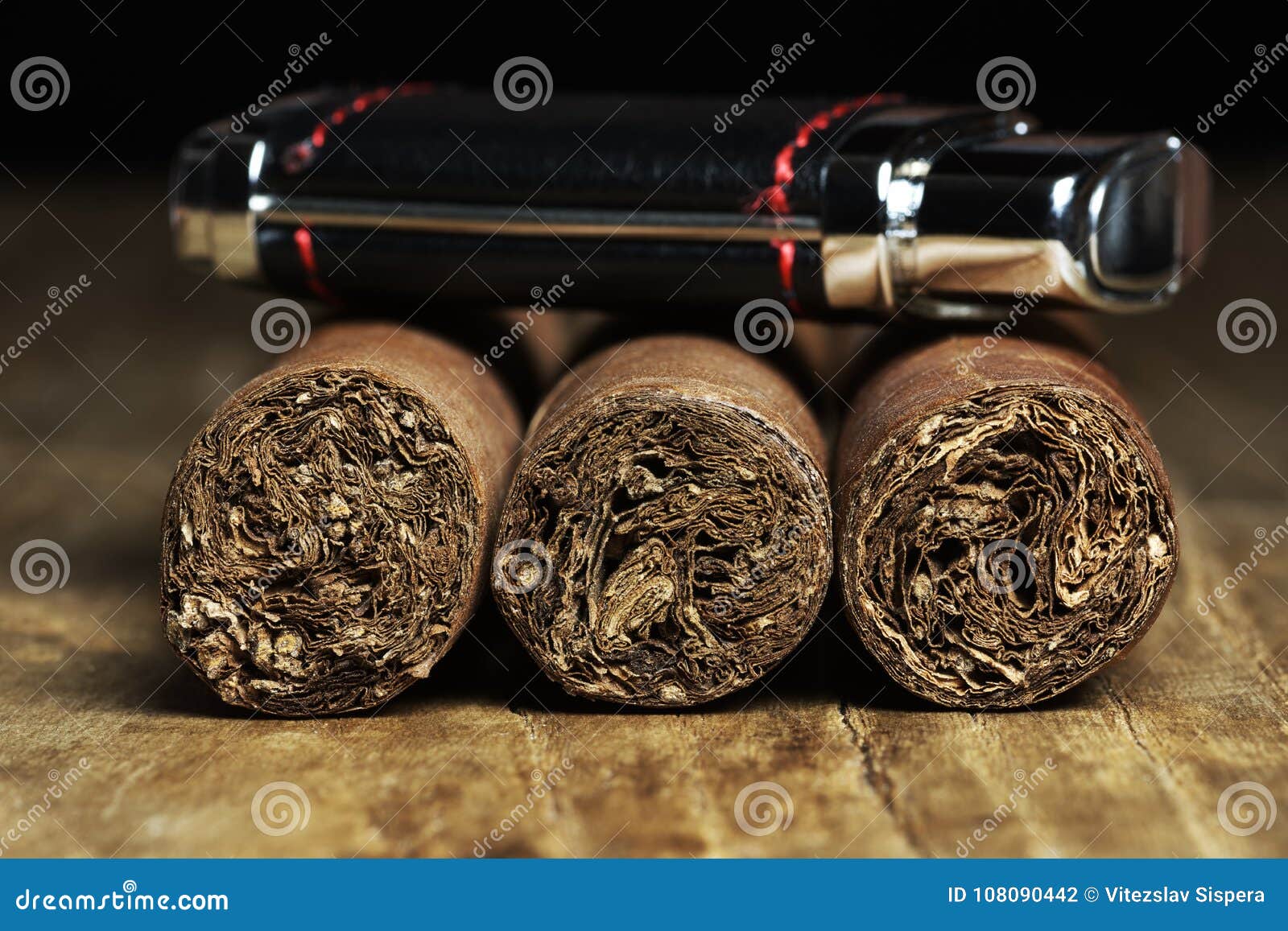 Three Cuban Cigars with a Lighter Stock Photo - Image of nicotine ...