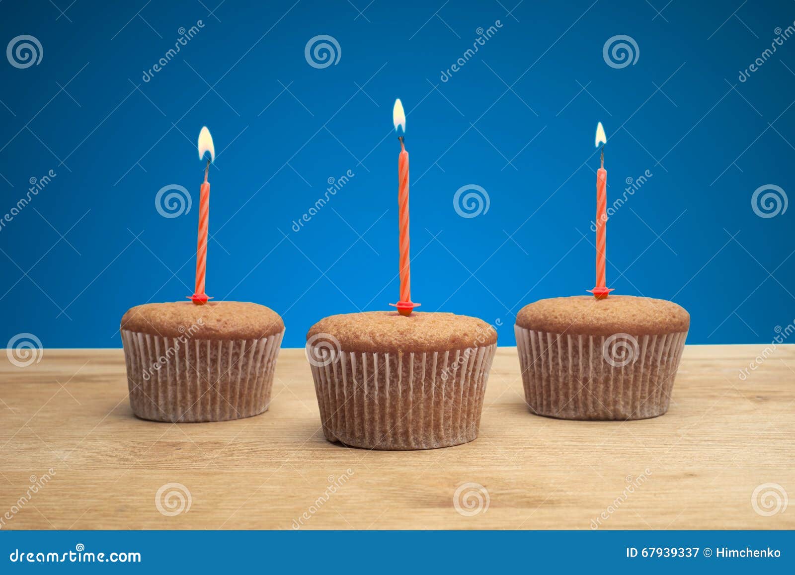 Three Cupcakes with Candles Stock Image - Image of copyspace, cupcakes ...