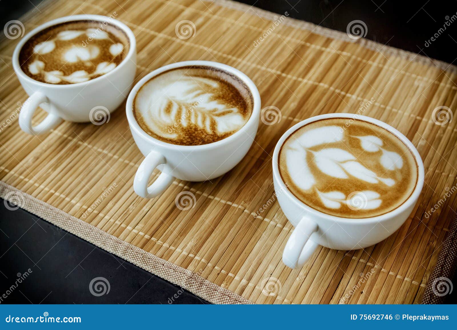 Three Cups of Cafe Latte with Three Shapes of Latte Art Stock Photo ...