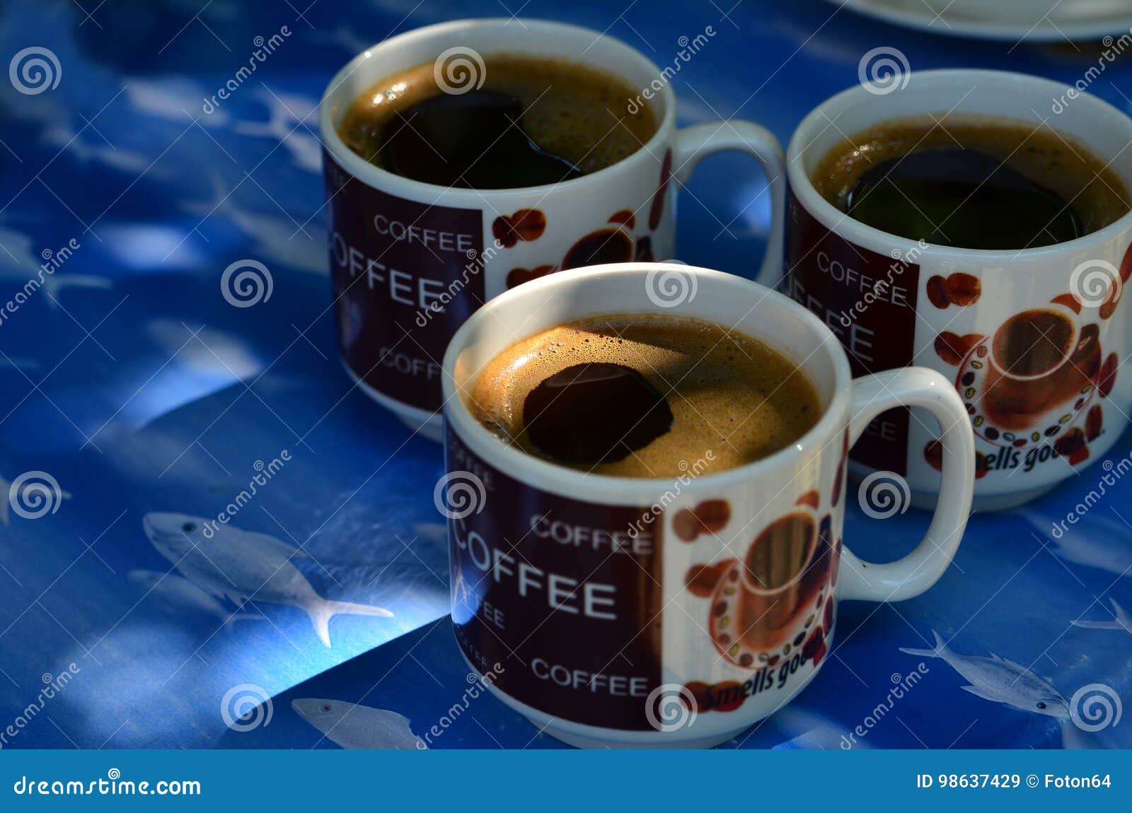 Three cups of coffee stock image. Image of strong, cups - 98637429