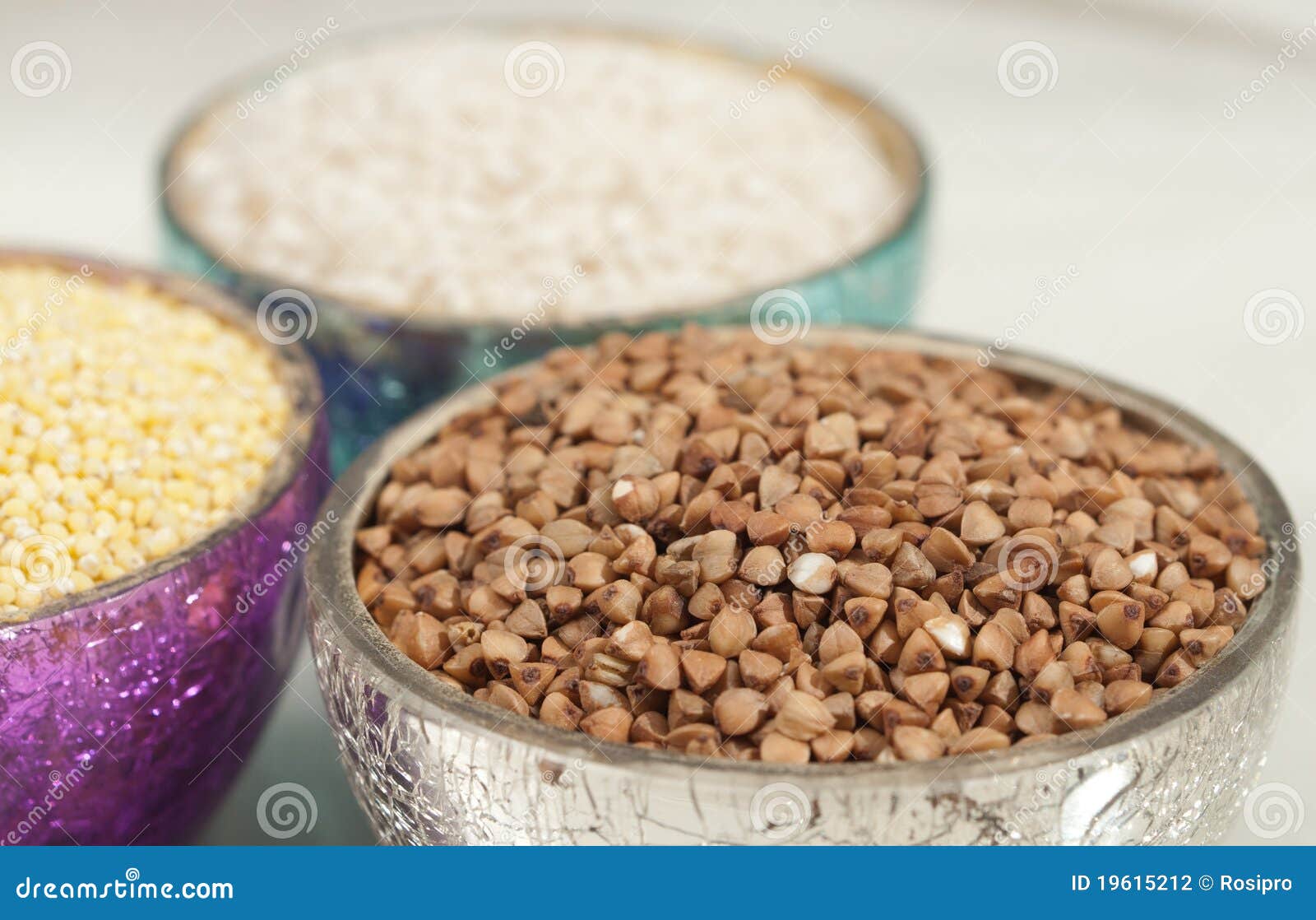 Three cups of grains stock photo. Image of close, brown - 19615212