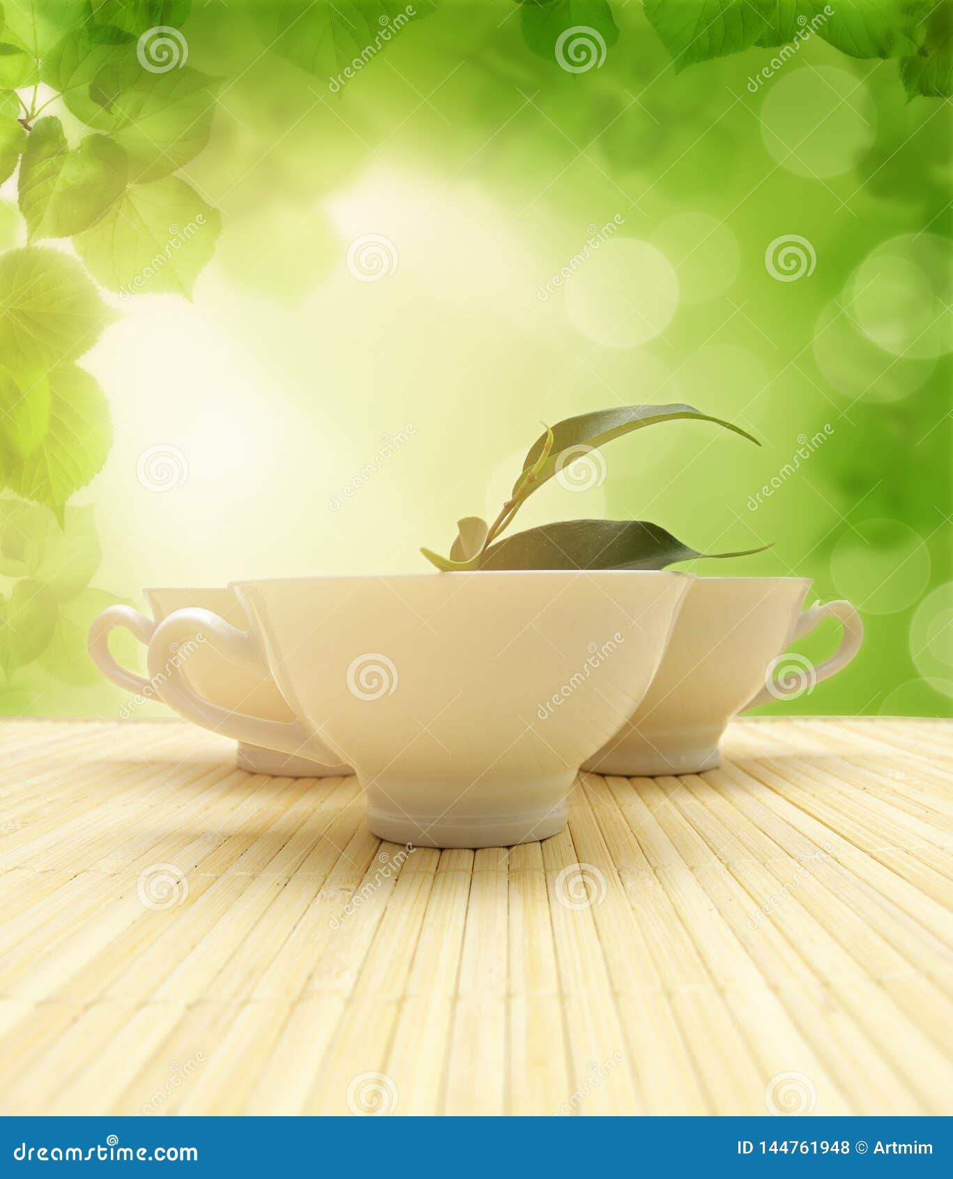 Three Cups of Tea and Green Leaves Stock Photo - Image of lighting ...