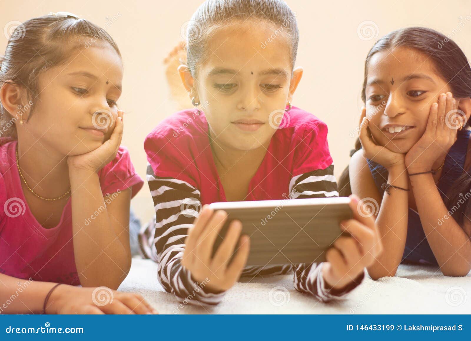 Three Cute Indian Children Watching Child Using Smartphone with Smiley ...