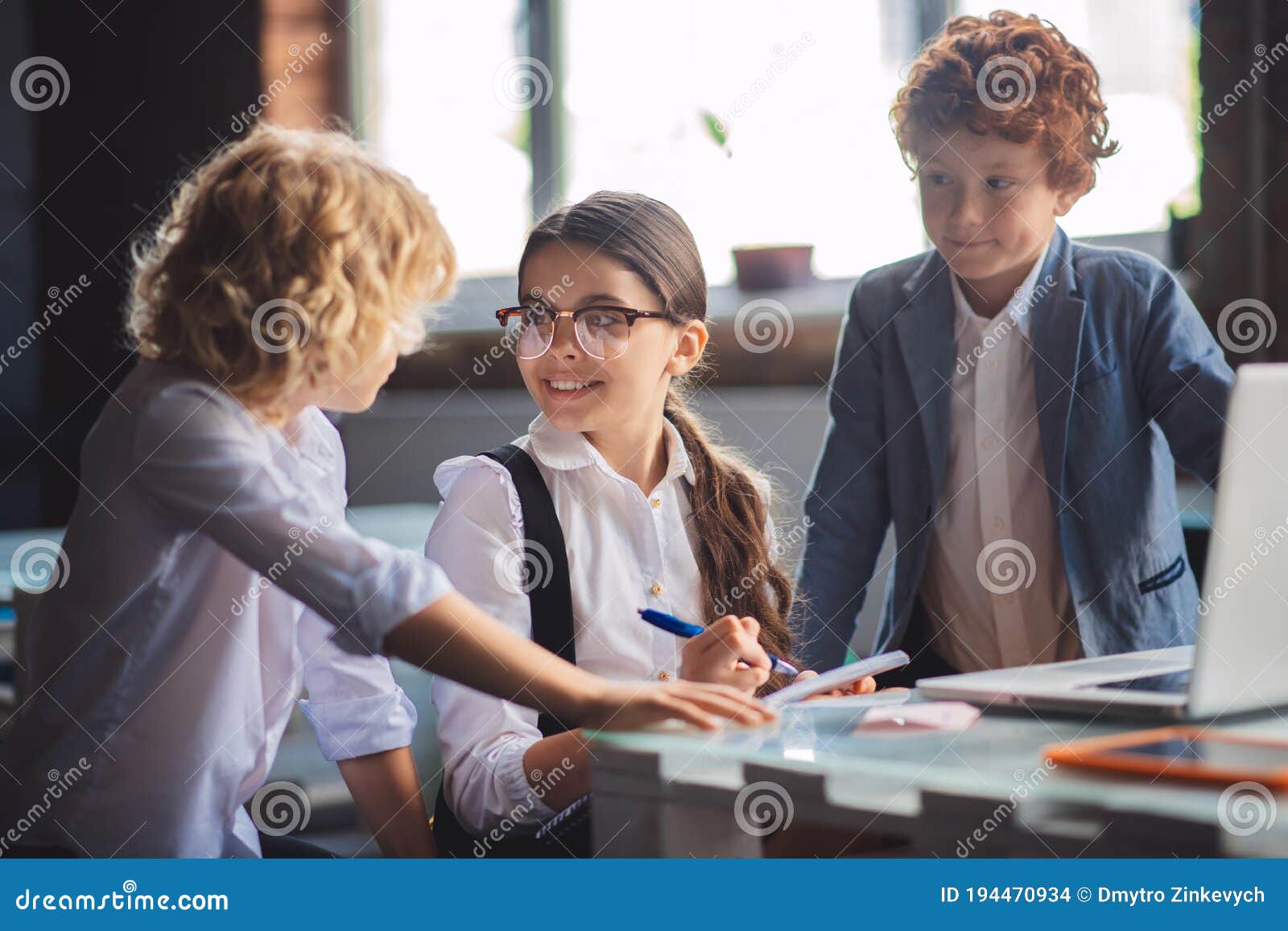 Three Cute Kids Working on Lessons Together Stock Photo - Image of ...