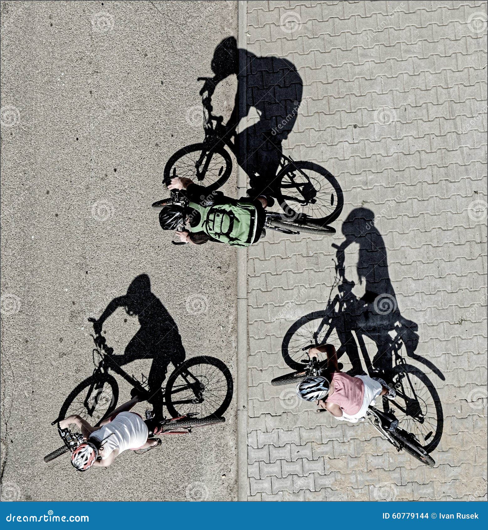 Three Cyclists Biking In A Single File Close To Water In The Westerpark ...