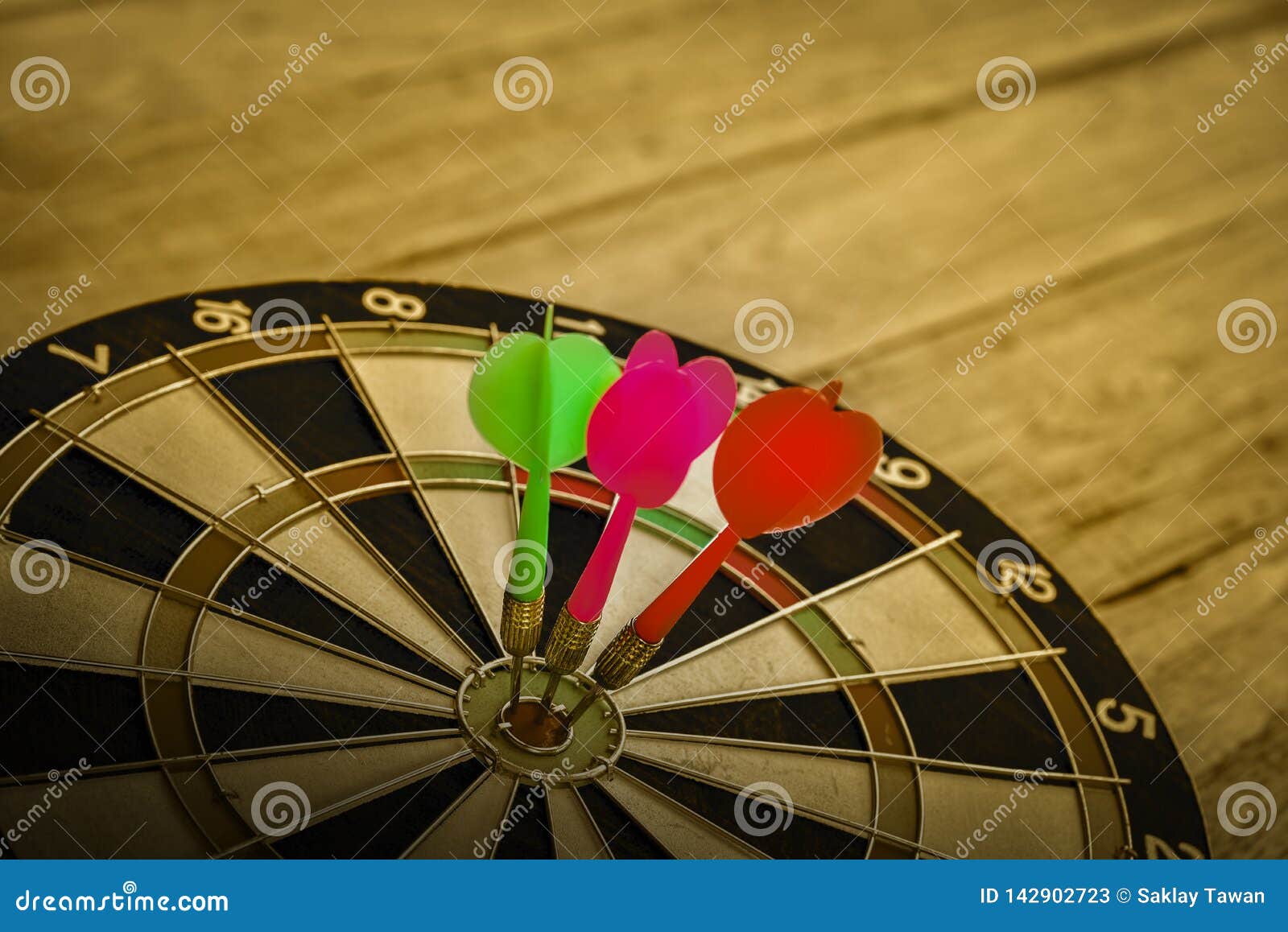 Three Dart Arrow Hitting in the Target Center of Dartboard. Stock Image ... Three Dart Arrow Hitting in the Target Center of Dartboard. Stock Image ...
