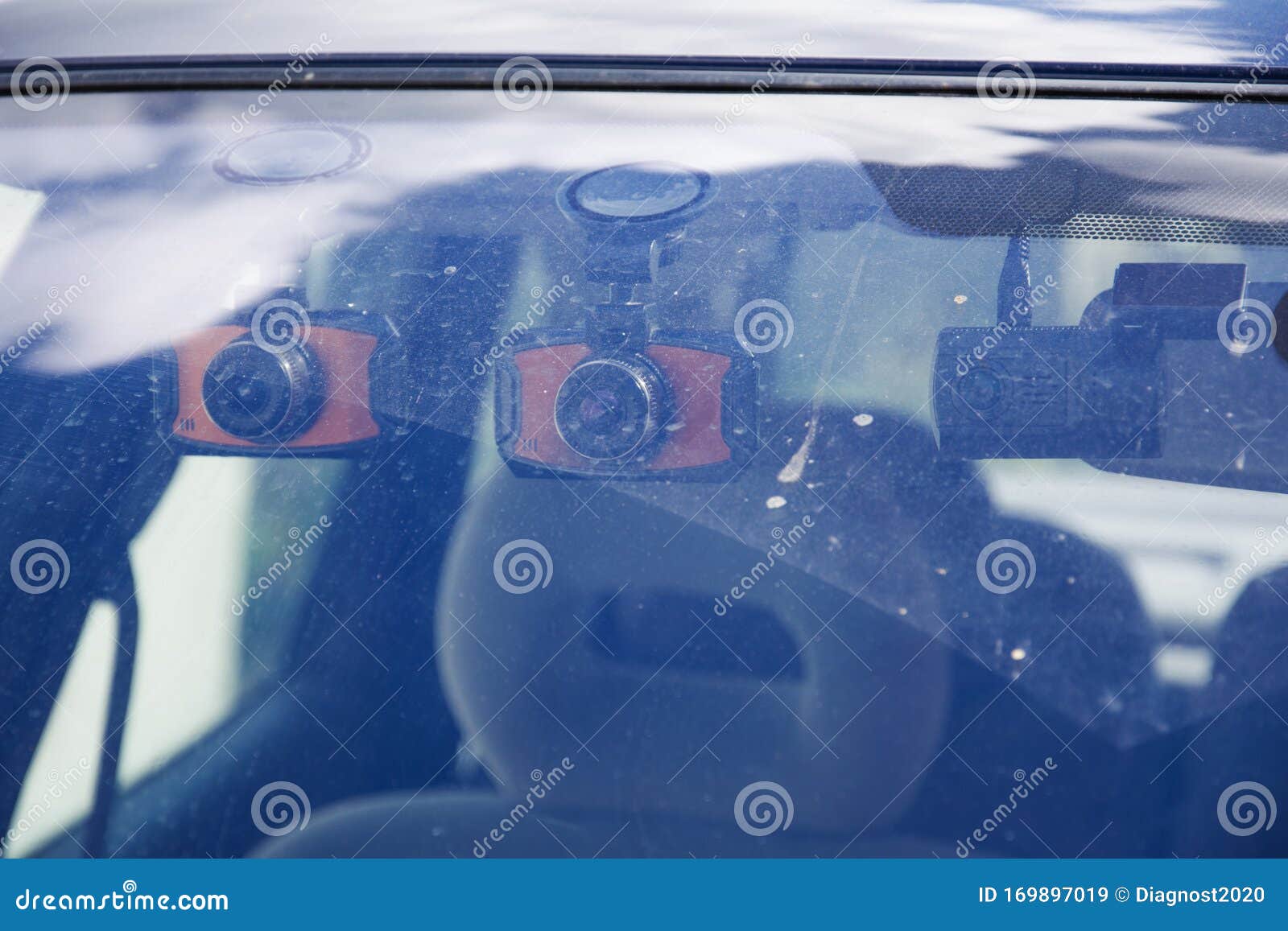Three Dashboard Camera Mounted on the Dirty Front Windshield. Car ...