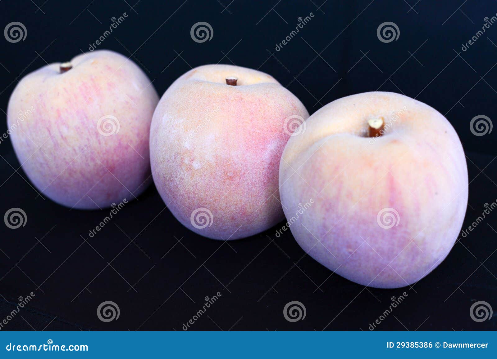 Three Decorative Plastic Peaches Stock Photo - Image of leaf ...