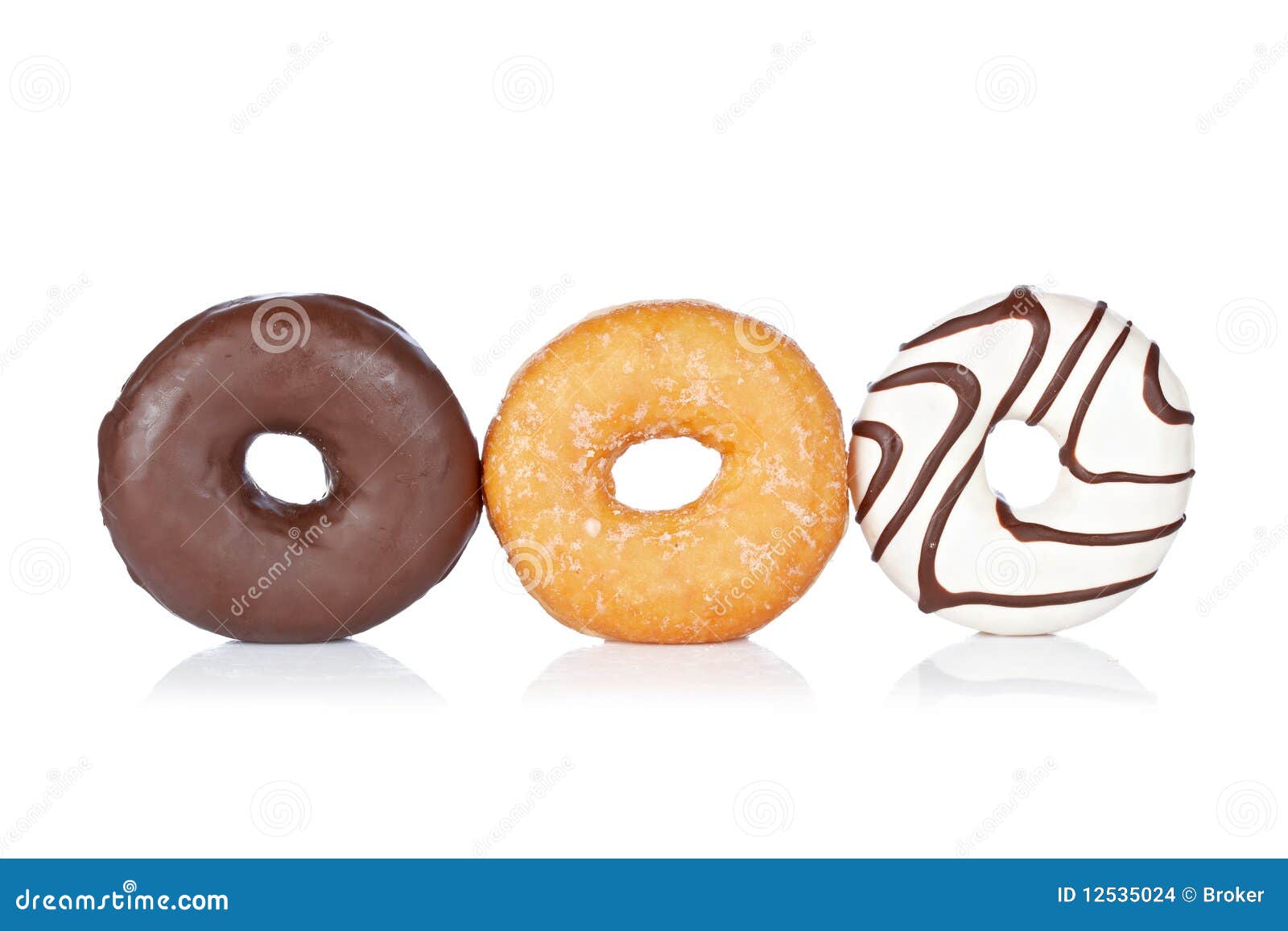 Three delicious donuts stock photo. Image of covered - 12535024