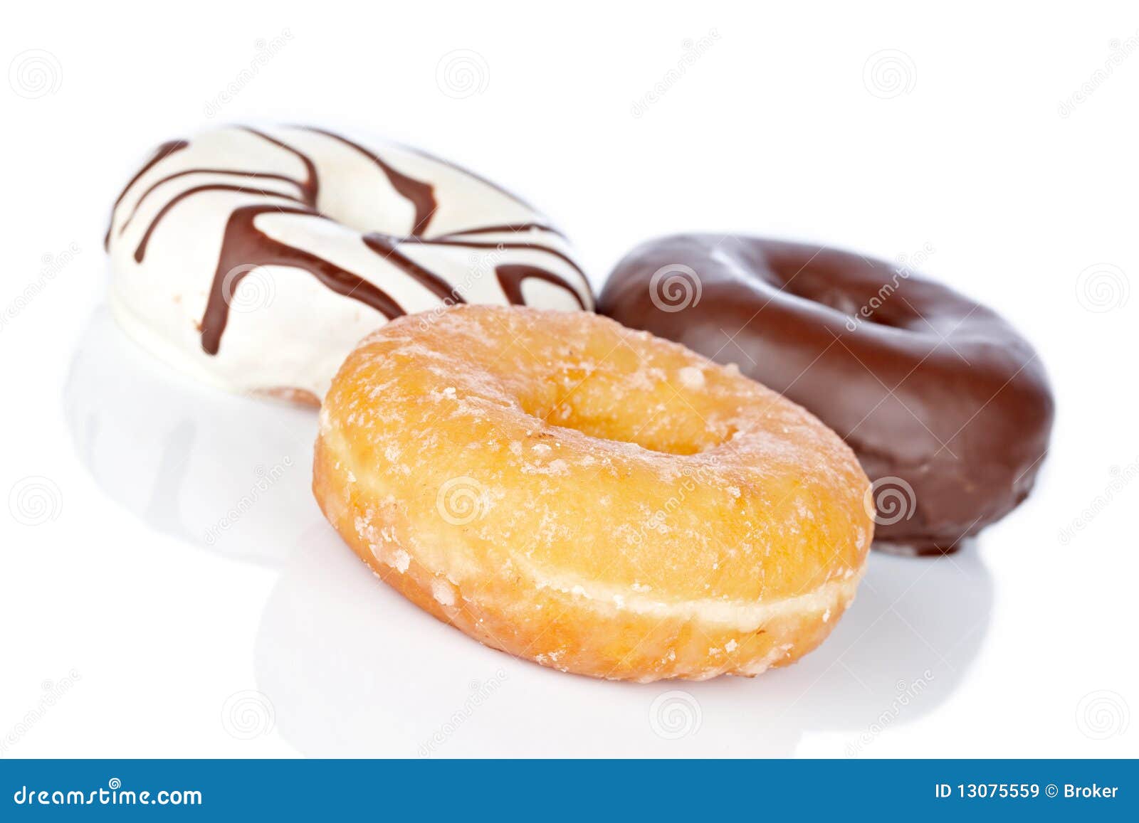 Three delicious donuts stock image. Image of covered - 13075559