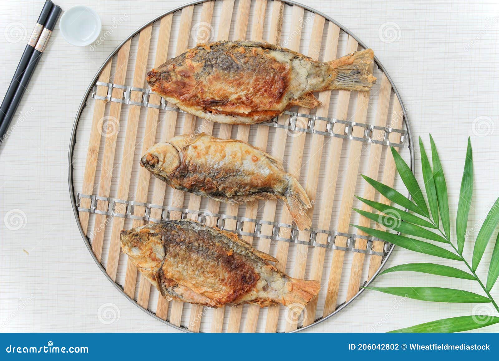 Three Delicious Fried Fish Lying on Table, Top View, Roasted Seafood ...
