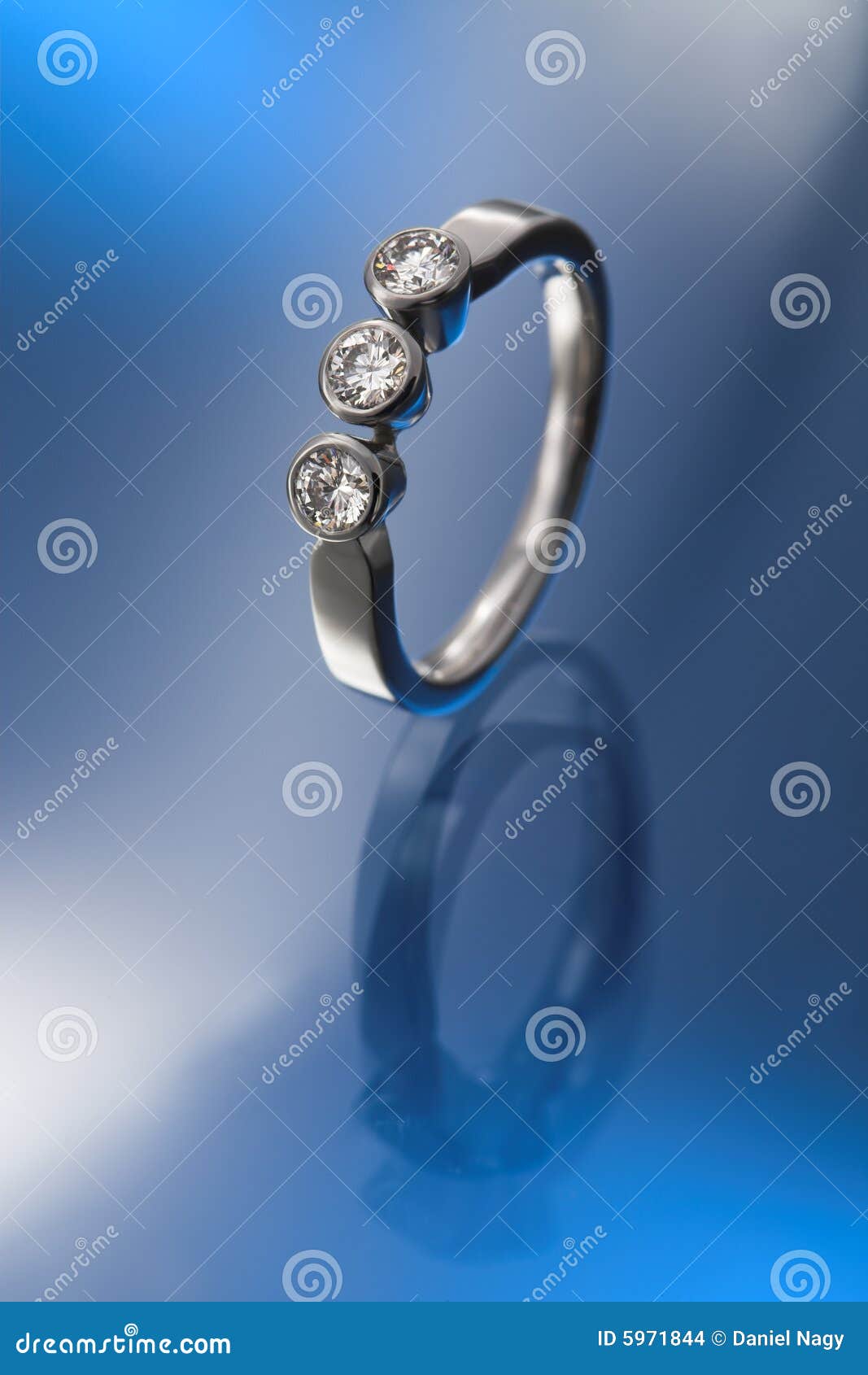 Three Diamonds Engagement Ring Stock Photo - Image of shiny, mode: 5971844