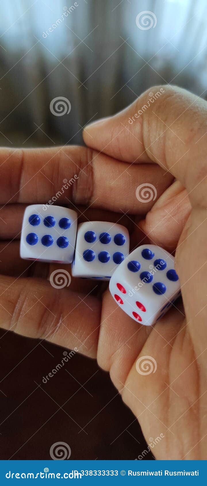 Three Dice (Latin: Datum) in Hand. Dice are Cube-shaped Game Tools ...