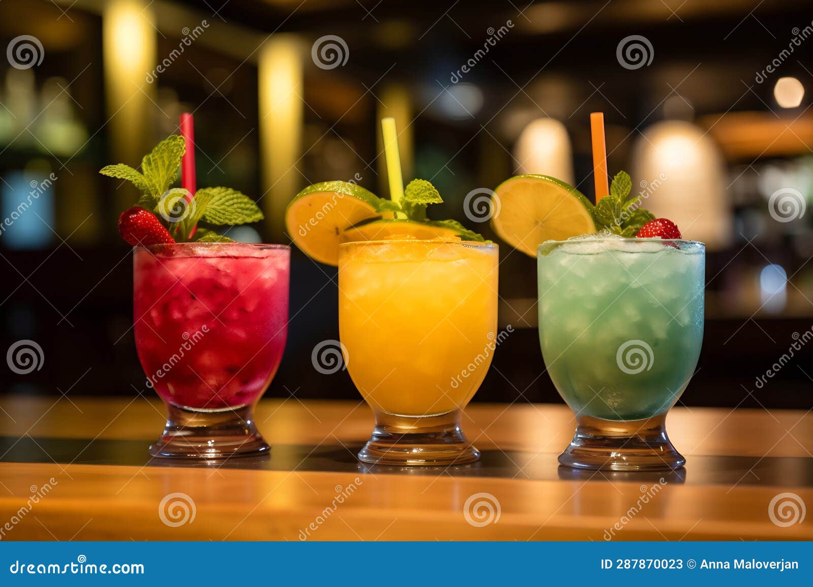 Three Different Colored Cocktails on the Bar Counter with Ice Spread ...