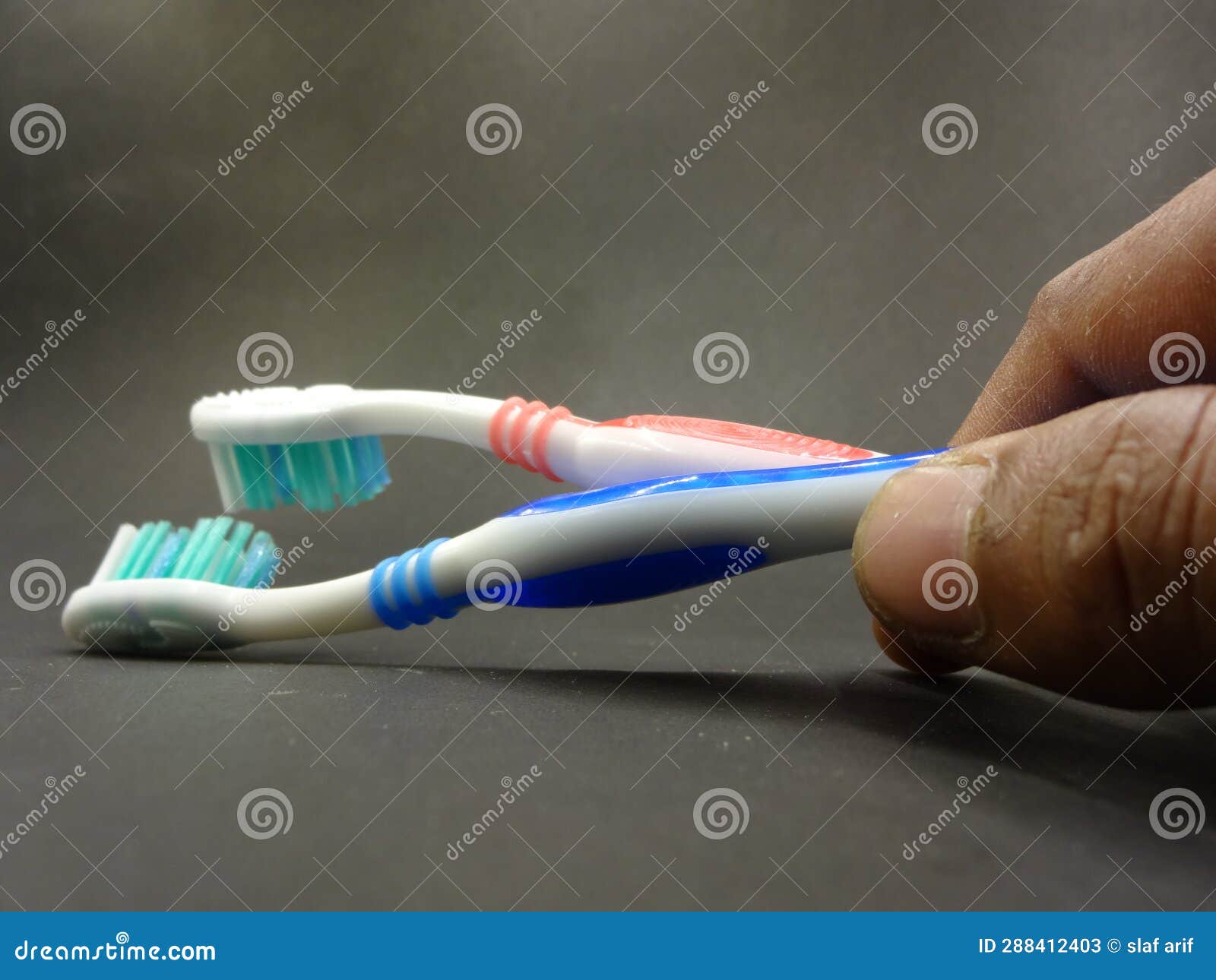 Three Different Colored Toothbrushes, Textured Handles that are ...