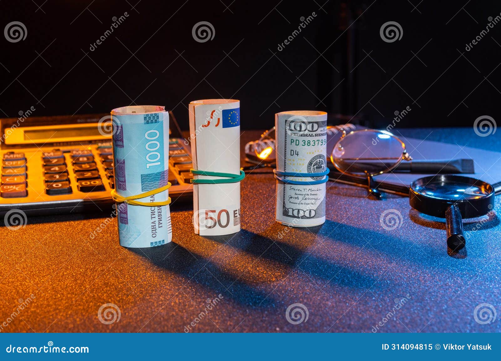 Three Different Currencies on the Table. Bundles of Money on the Table ...