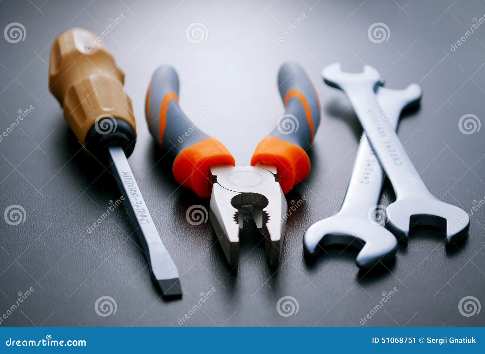 Three Different Hand Tools on a Gray Background Stock Image - Image of ...