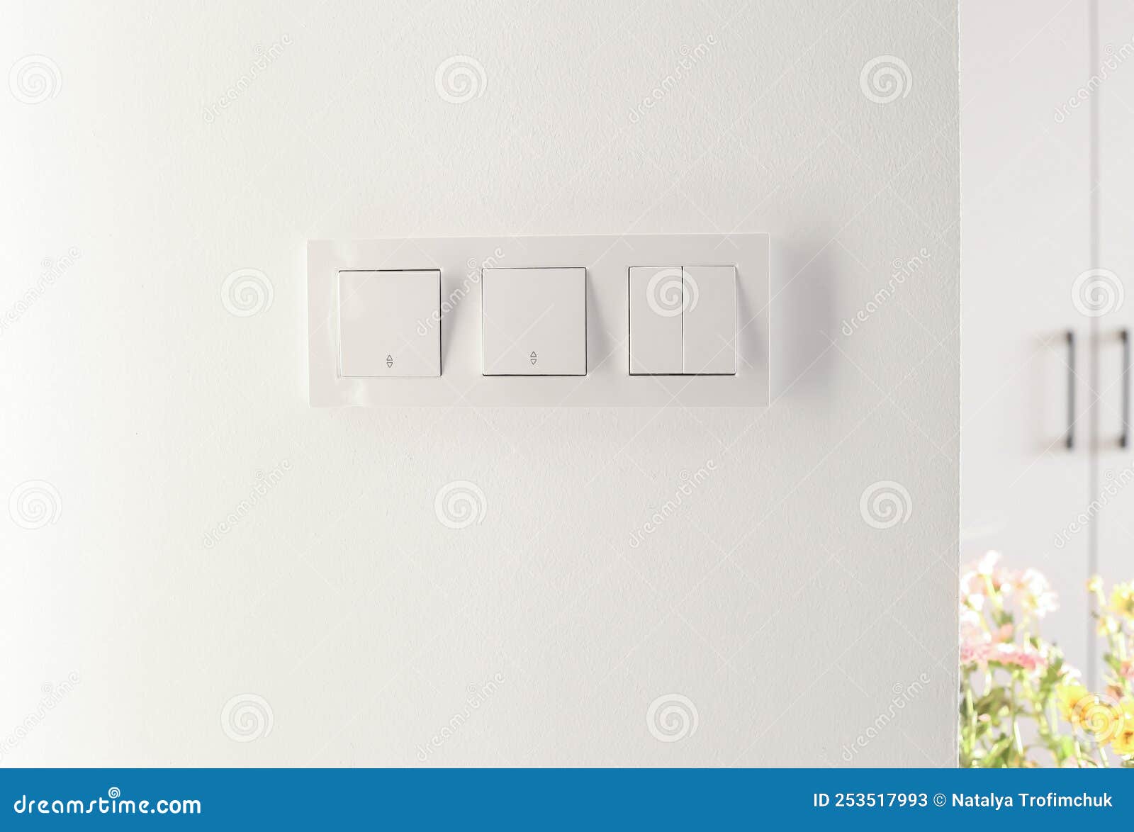 Three Different Light Switches on a White Wall Background. Electrical ...
