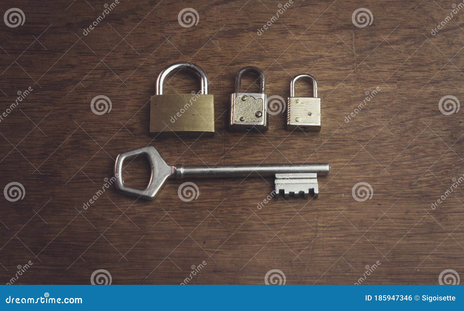 Three Different Padlock and One Big Key Stock Photo - Image of padlock ...