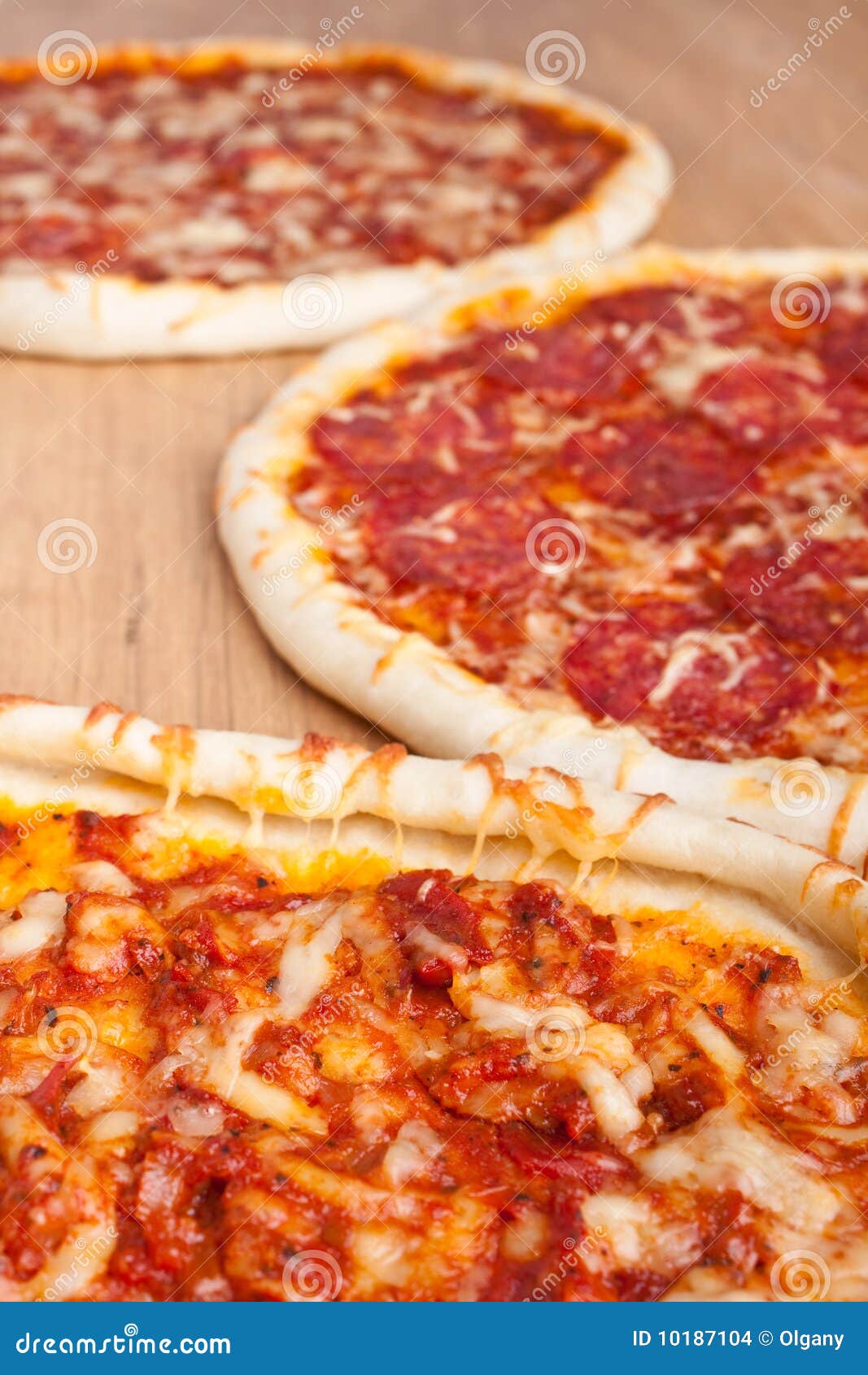 Three different pizzas stock photo. Image of prepared - 10187104