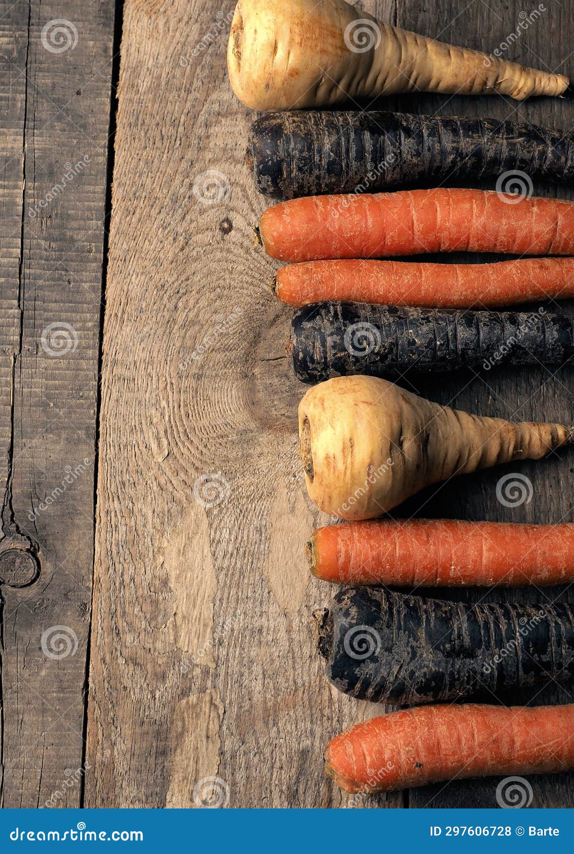 Three Different Root Vegetables on a Rustic Wooden Table Stock Photo ...