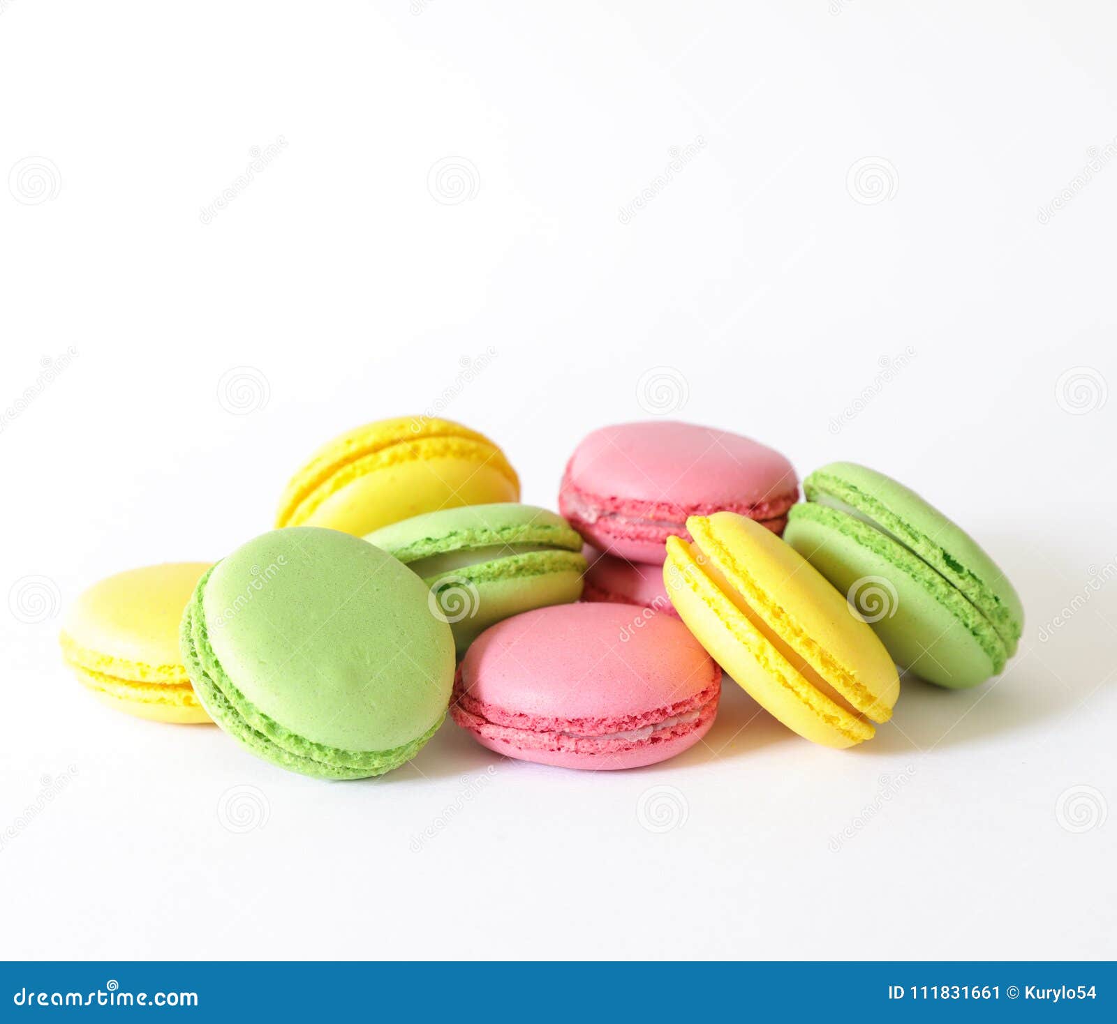 Three Different Types of Macaroons Colors Pink, Green and Yellow ...