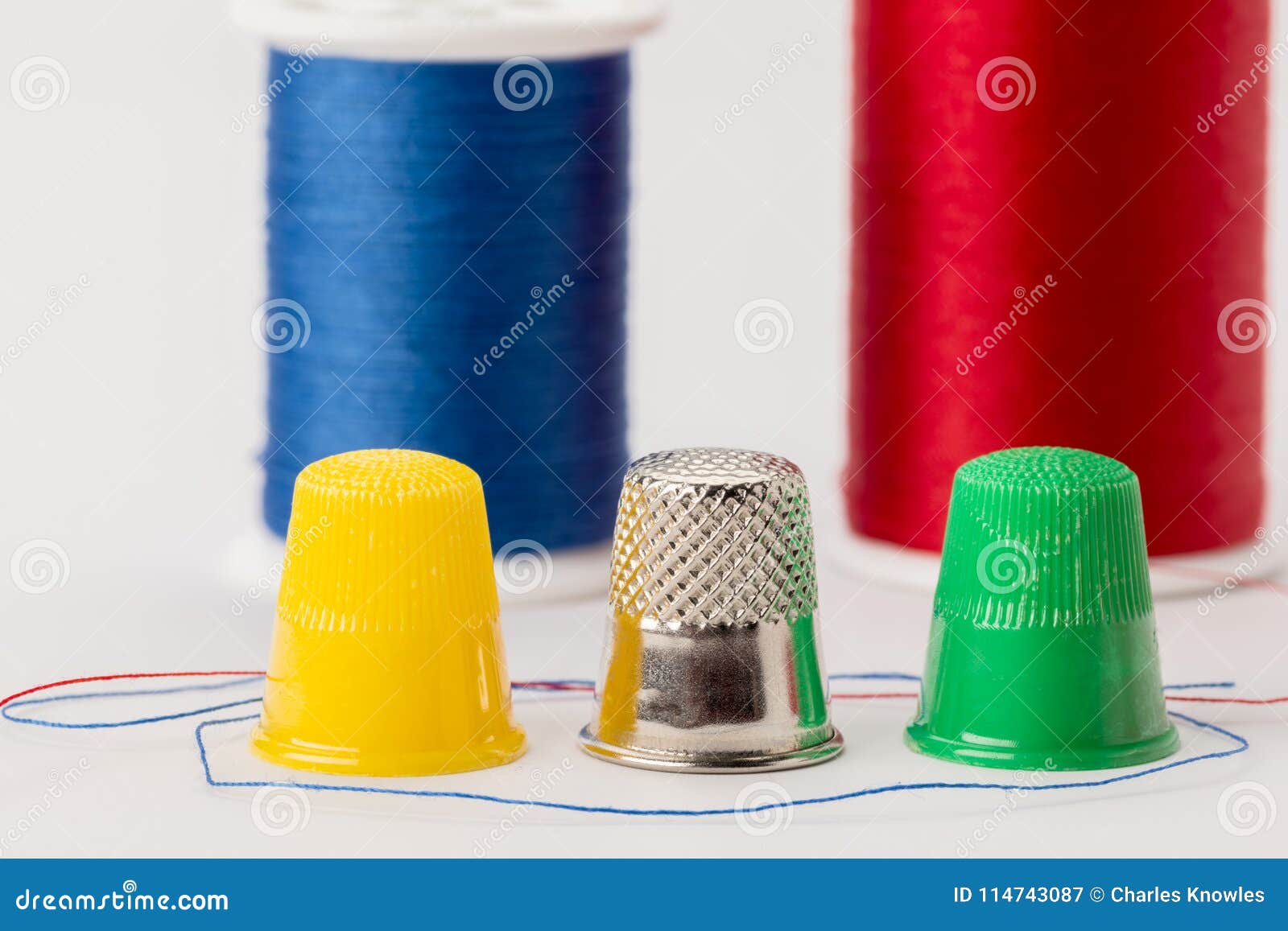 Three Different Types of Thimbles and Spools of Thread in the Ba Stock ...