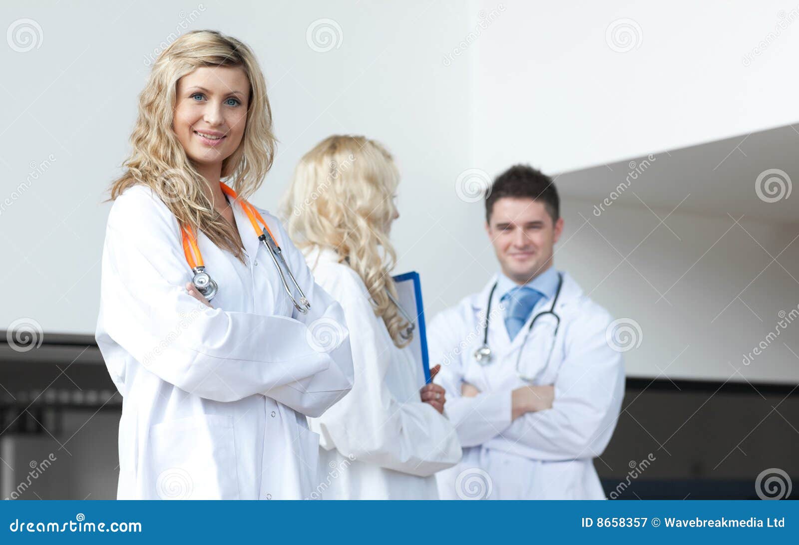 Three Doctors in a Hospital Stock Image - Image of laboratory, happy ...