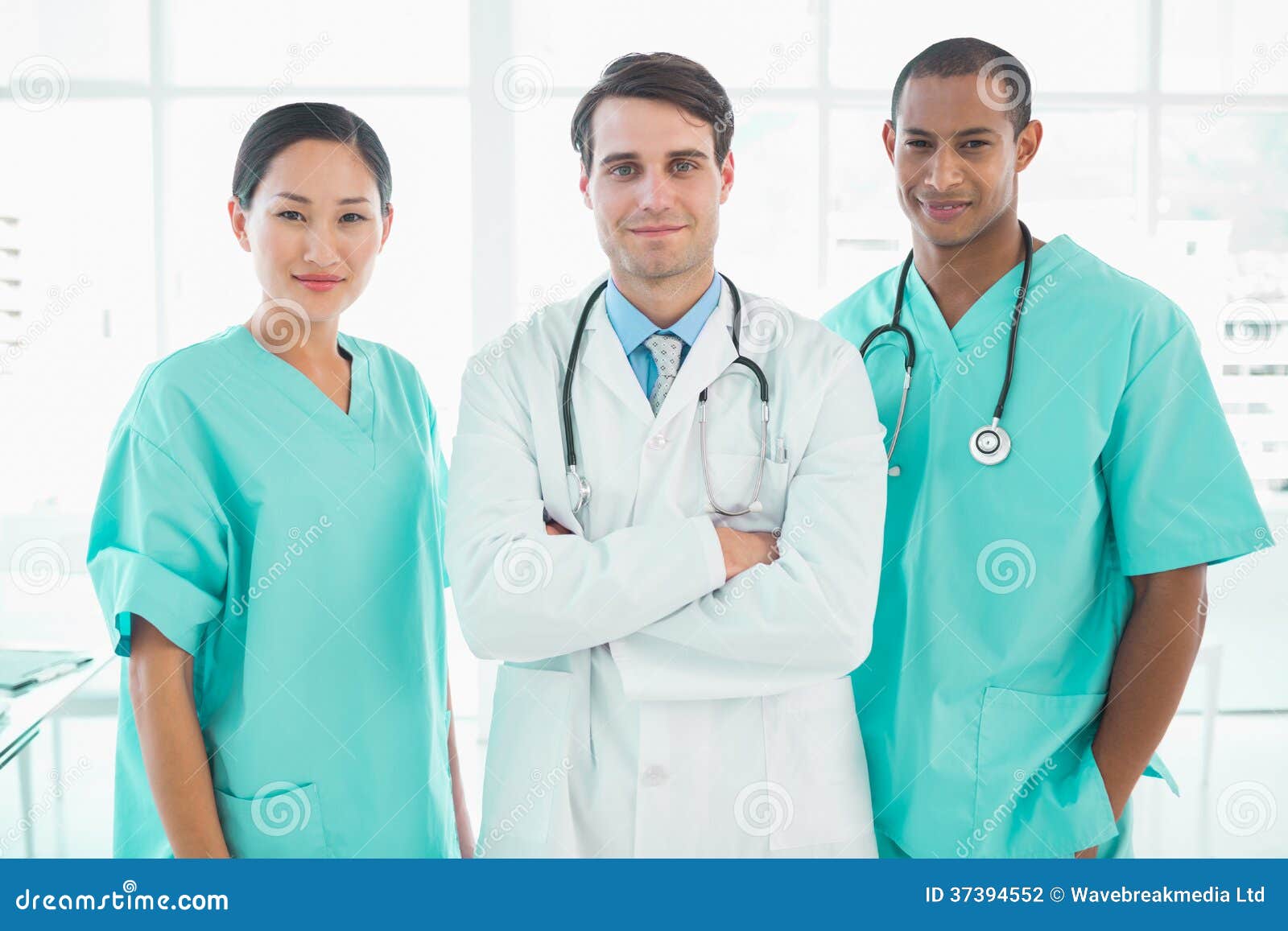 Three Doctors Standing Together at Hospital Stock Photo - Image of ...