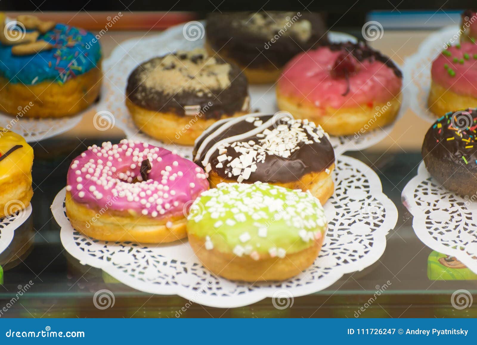 Three Doughnuts on the Counter Closeup Stock Image - Image of glazed ...