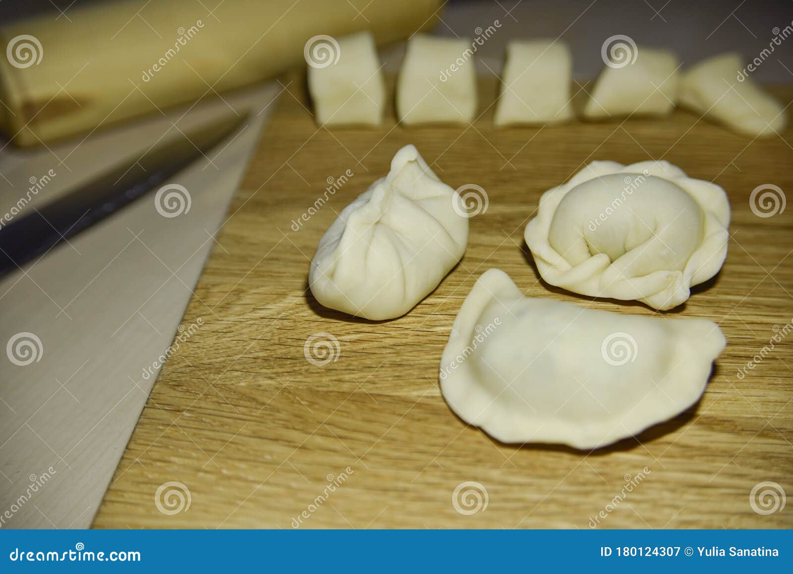 Three Dumplings of Different Shape on the Wooden Deck Stock Image ...
