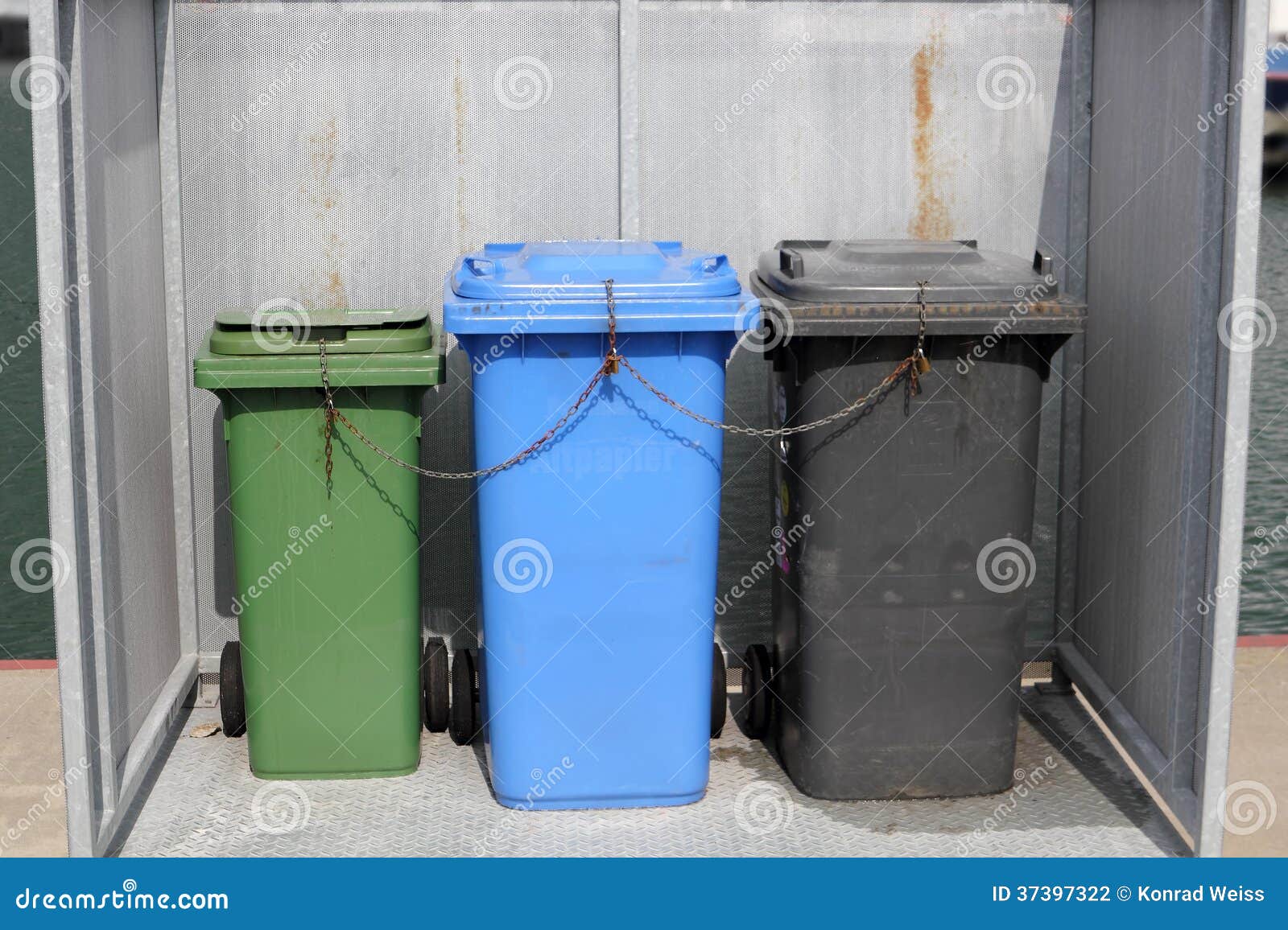 Three dustbins in a box stock photo. Image of green, grey - 37397322