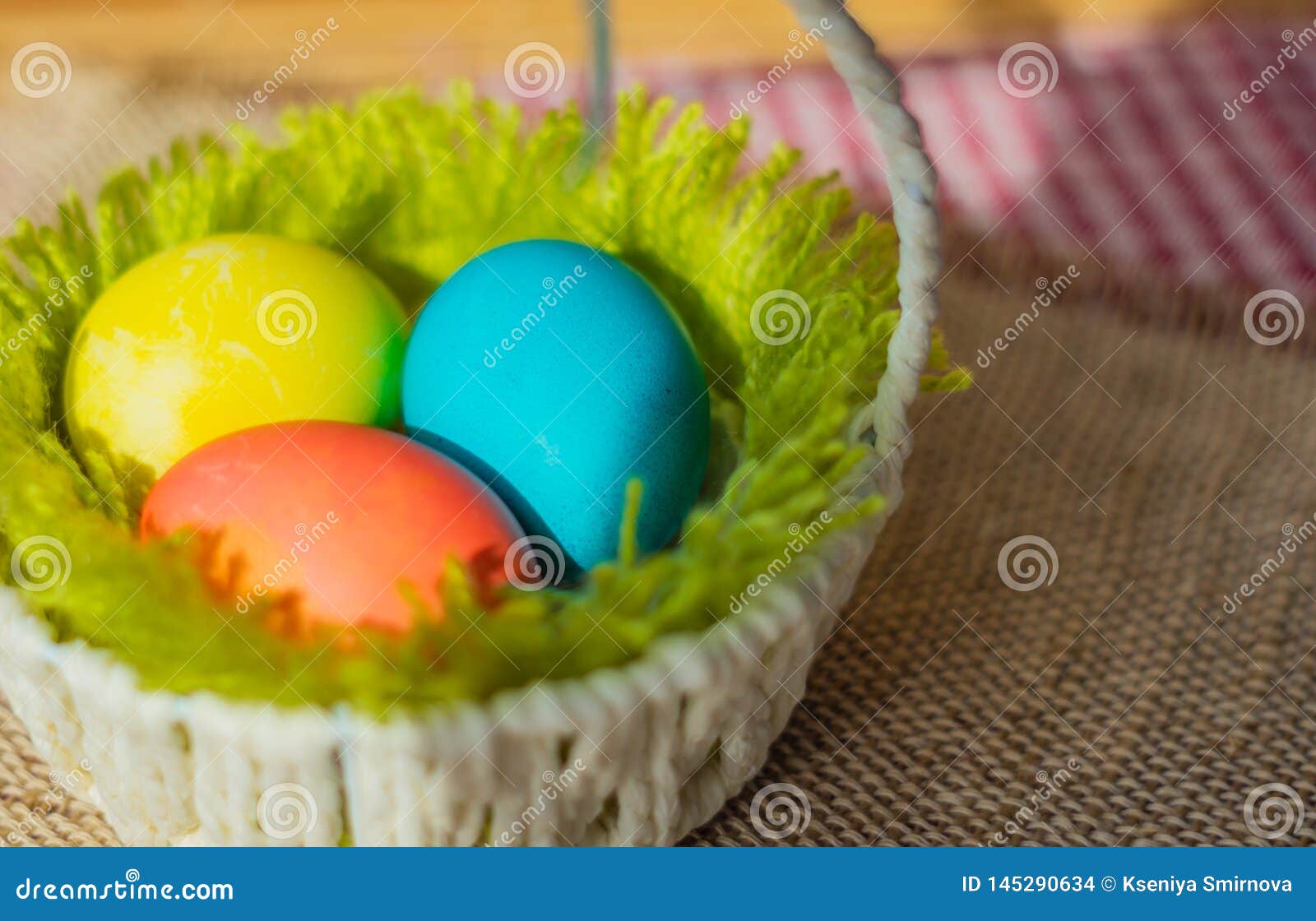 Three Easter Eggs in a Basket Stock Photo - Image of blue, good: 145290634