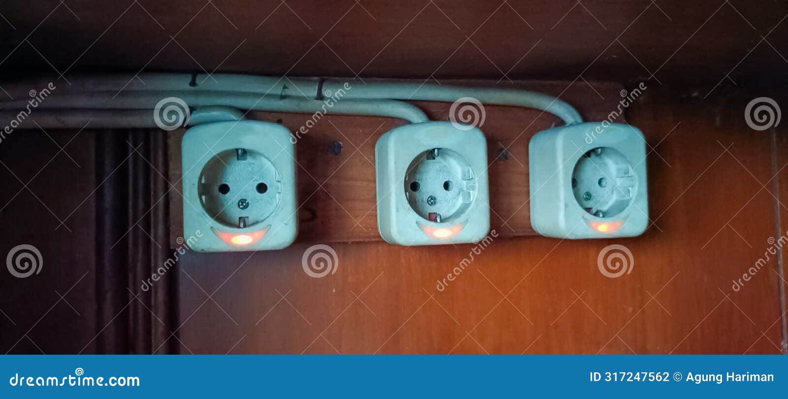 Three Electrical Outlets Under the Table Stock Photo - Image of table ...