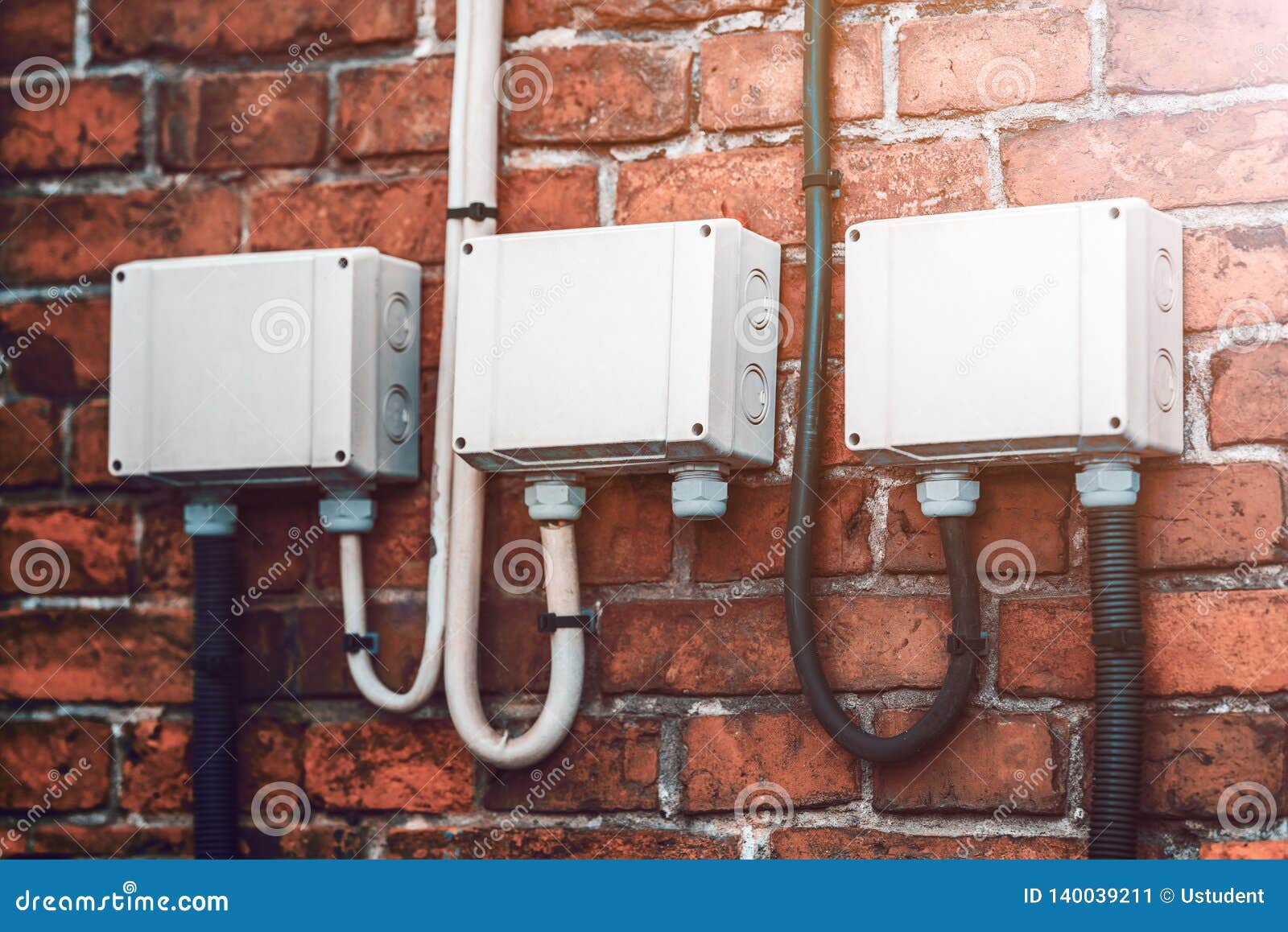 Electric Shields on the Brick Wall Stock Image - Image of cable, wire ...