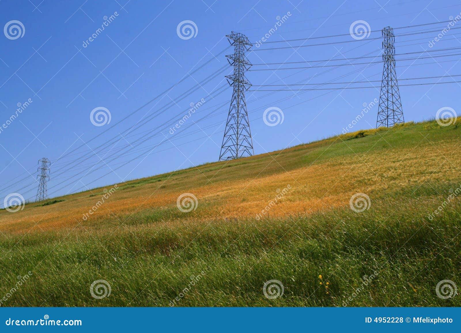 Three Electricity Pylons With Cables Are Staggered As Silhouettes In ...