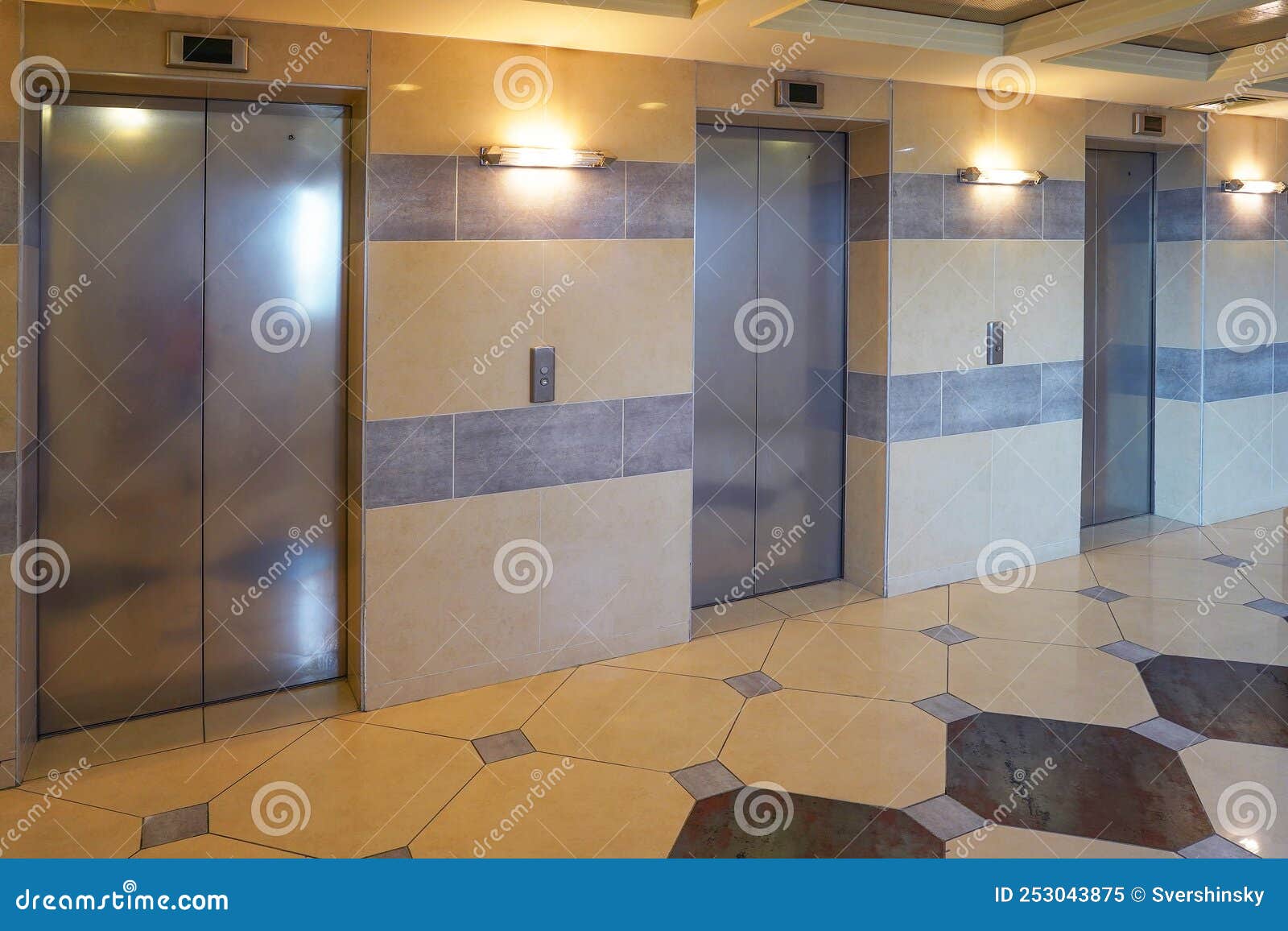Three Elevator Doors In A Residential Building. Wide-angle View Of ...