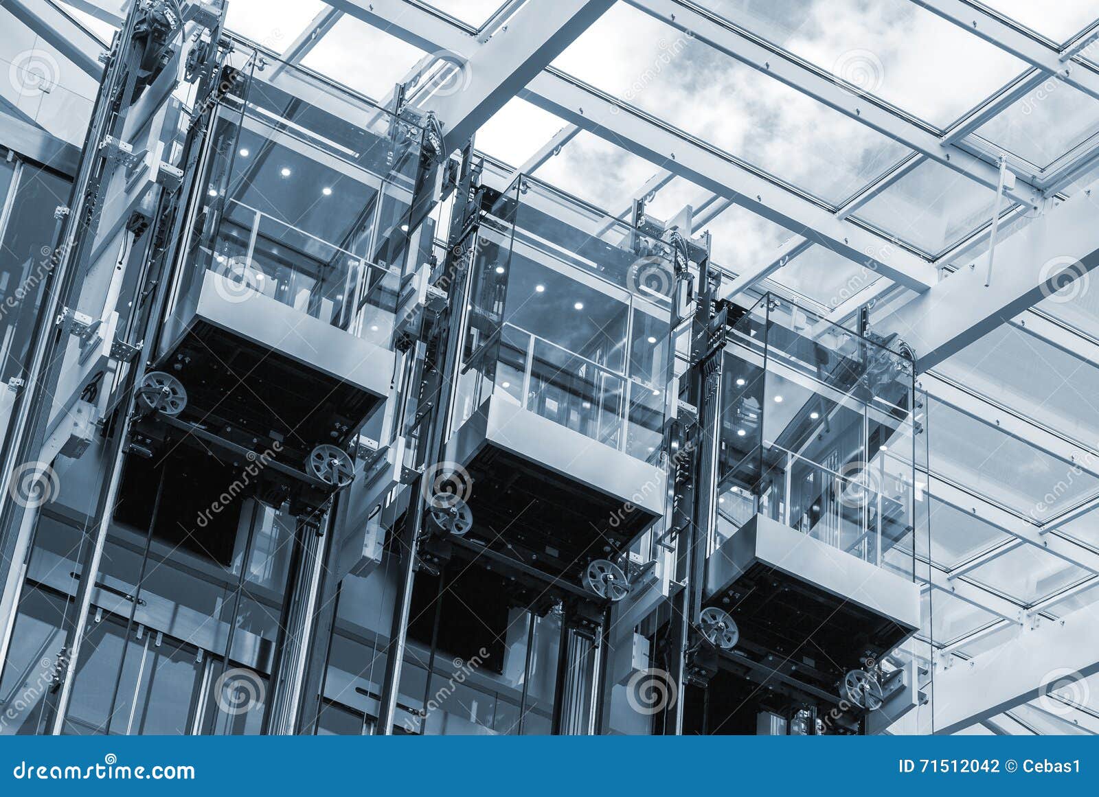 Three Elevators in a Business Center Stock Photo - Image of glass ...
