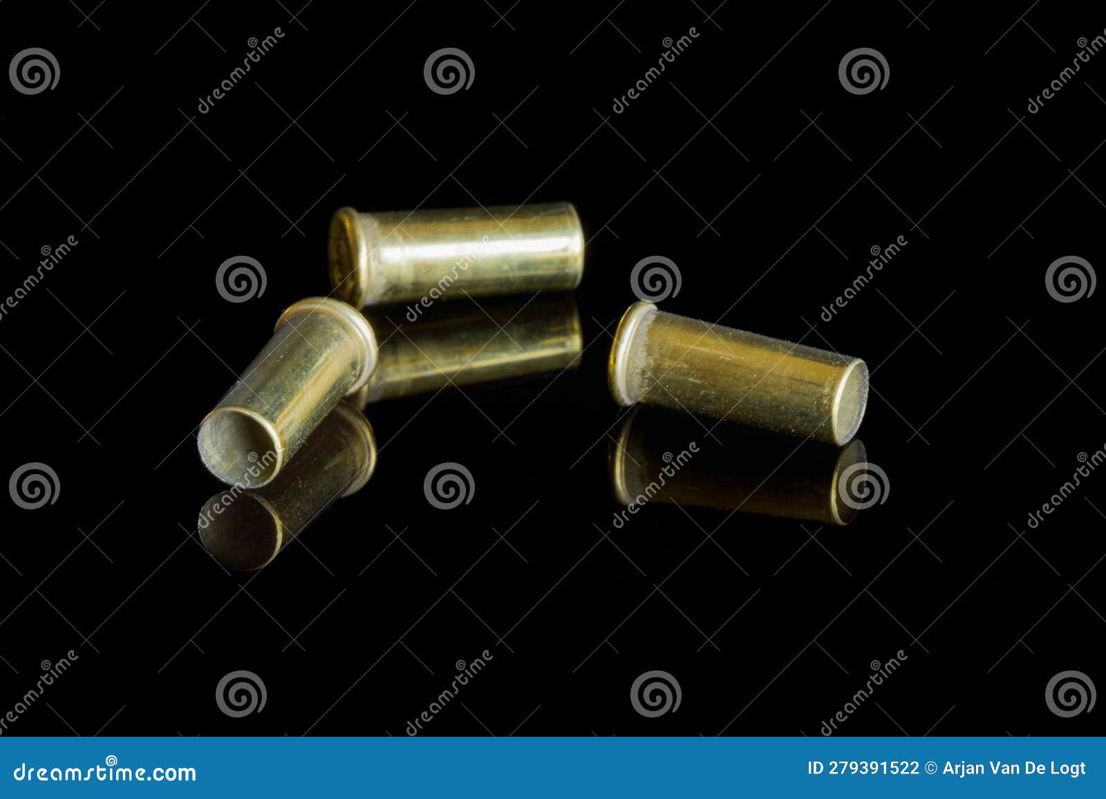 Three Empty Cartridges of Small Caliber Bullets Stock Photo - Image of ...