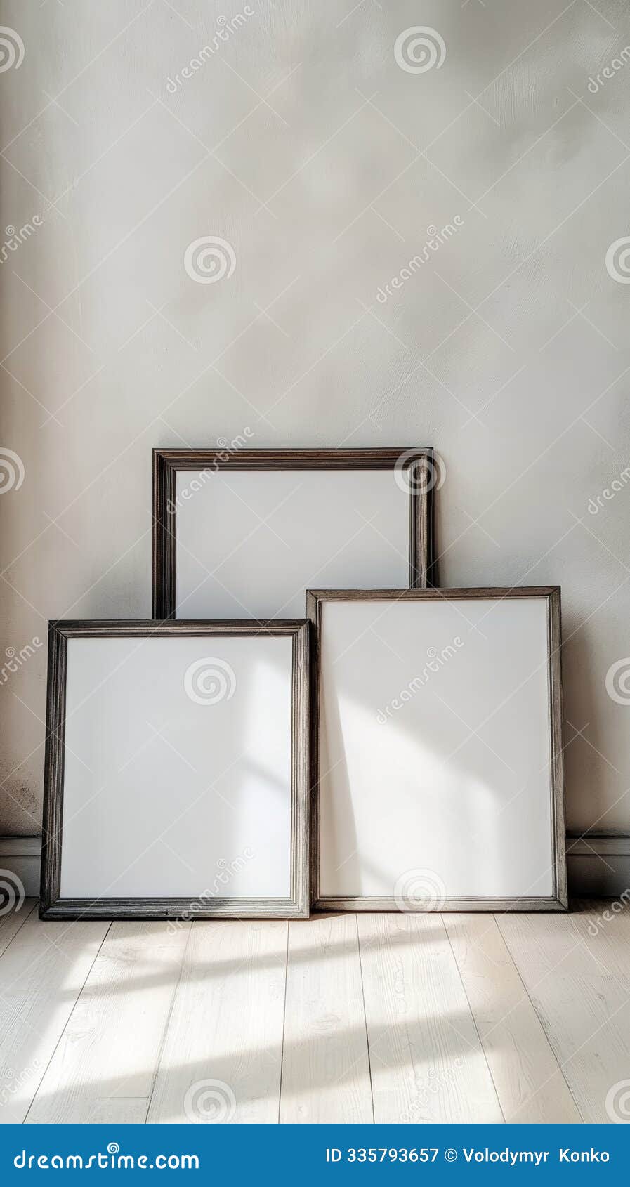 Three Empty Frames Leaning Against a Textured Wall, Minimalist Interior ...