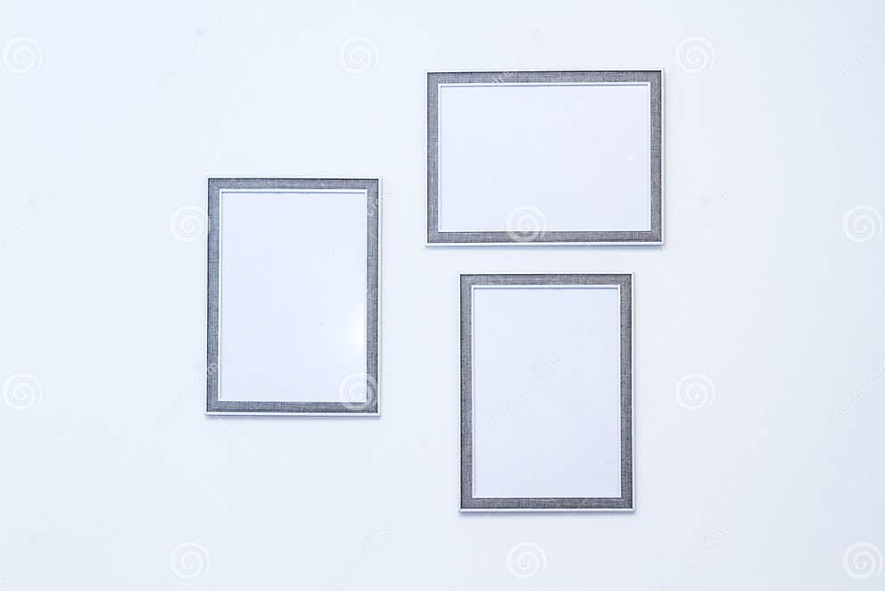 Three Empty Frames on the White Wall. Stock Image - Image of background ...