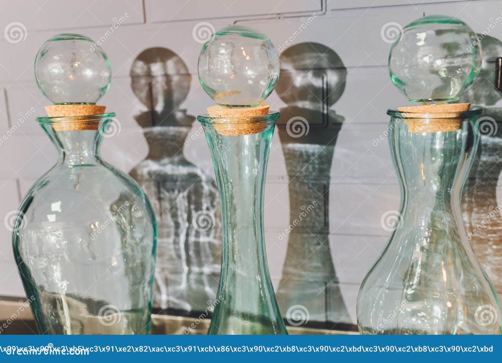 Three Empty Glass Bottles Standing in a Row. Stock Image - Image of ...