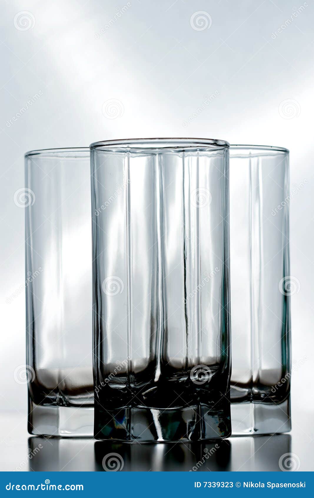 Three empty glasses stock image. Image of beverage, clear - 7339323